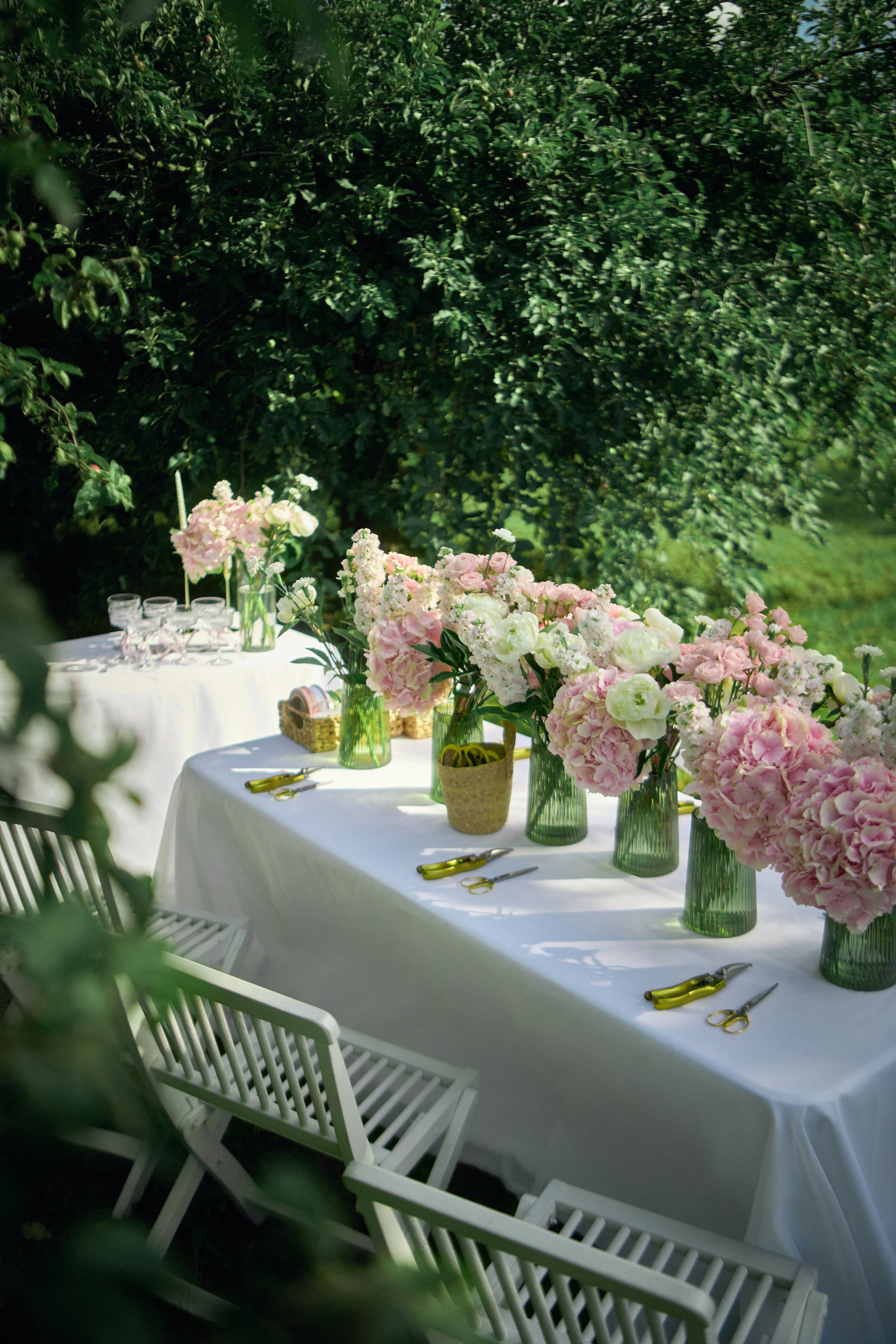 Floral banquet along a sunlit garden table