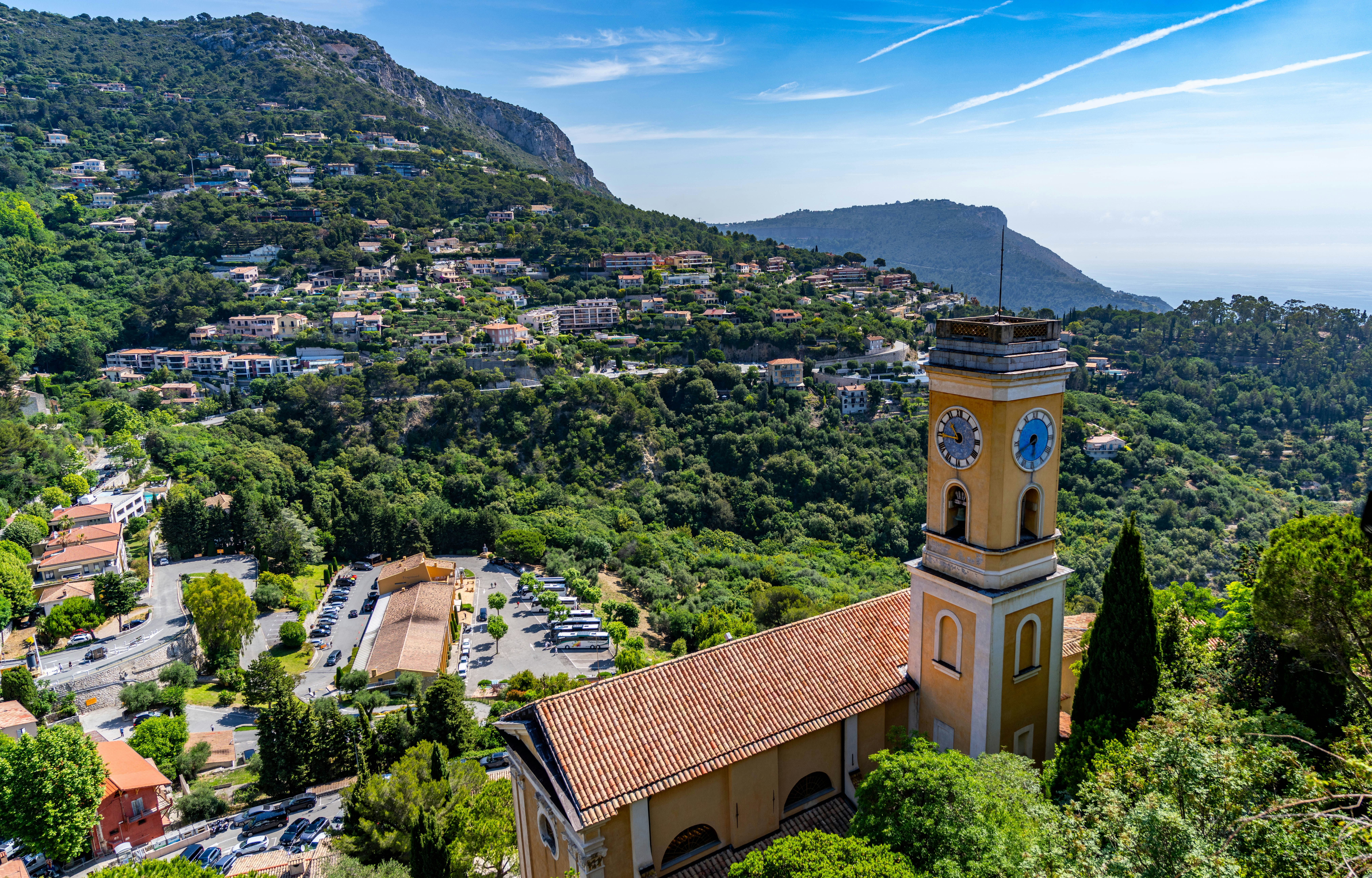 Bell Tower Overlooking a Sunlit hillside village
