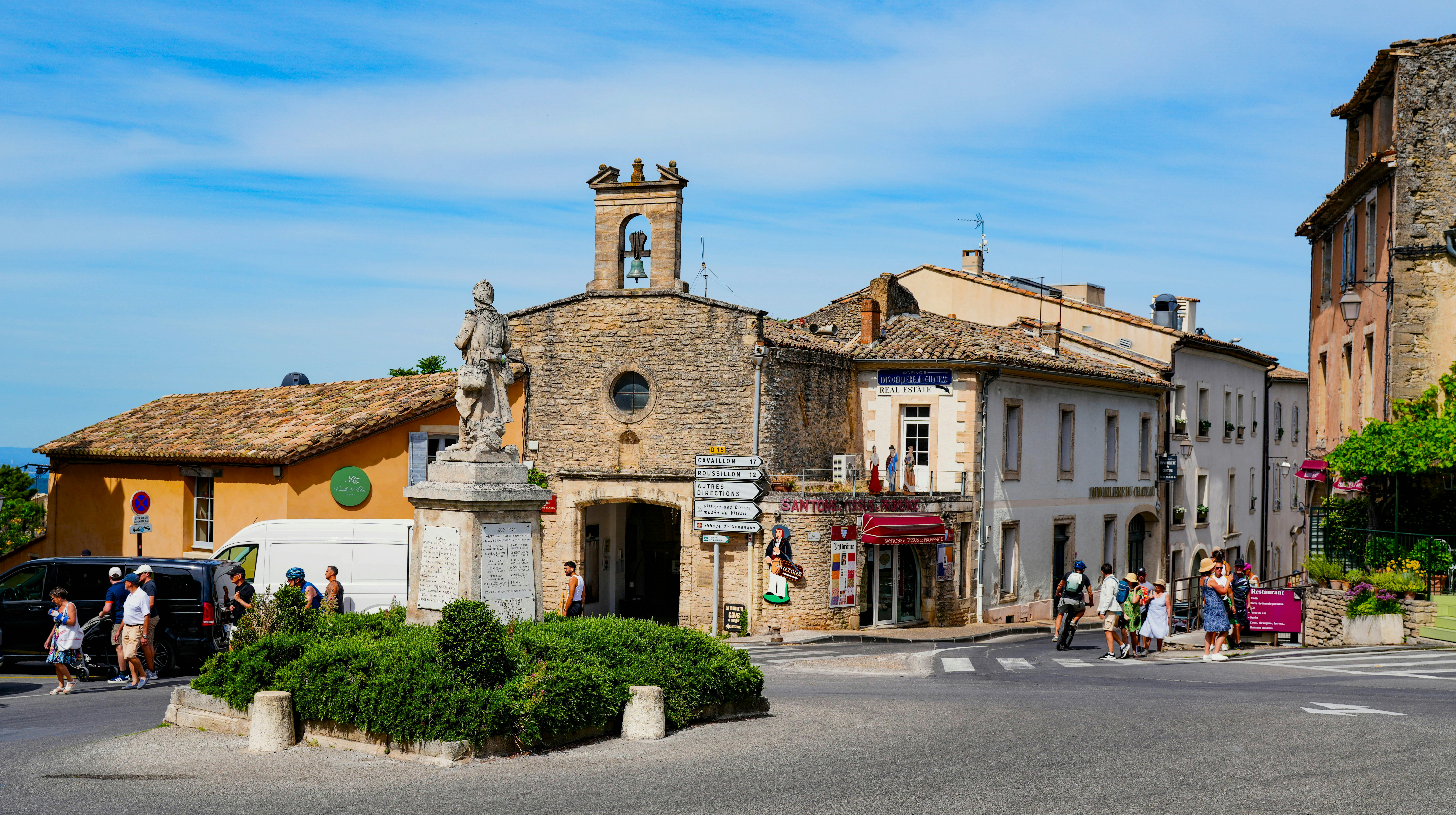 Village Square with Historic Church and Bustling Stairs