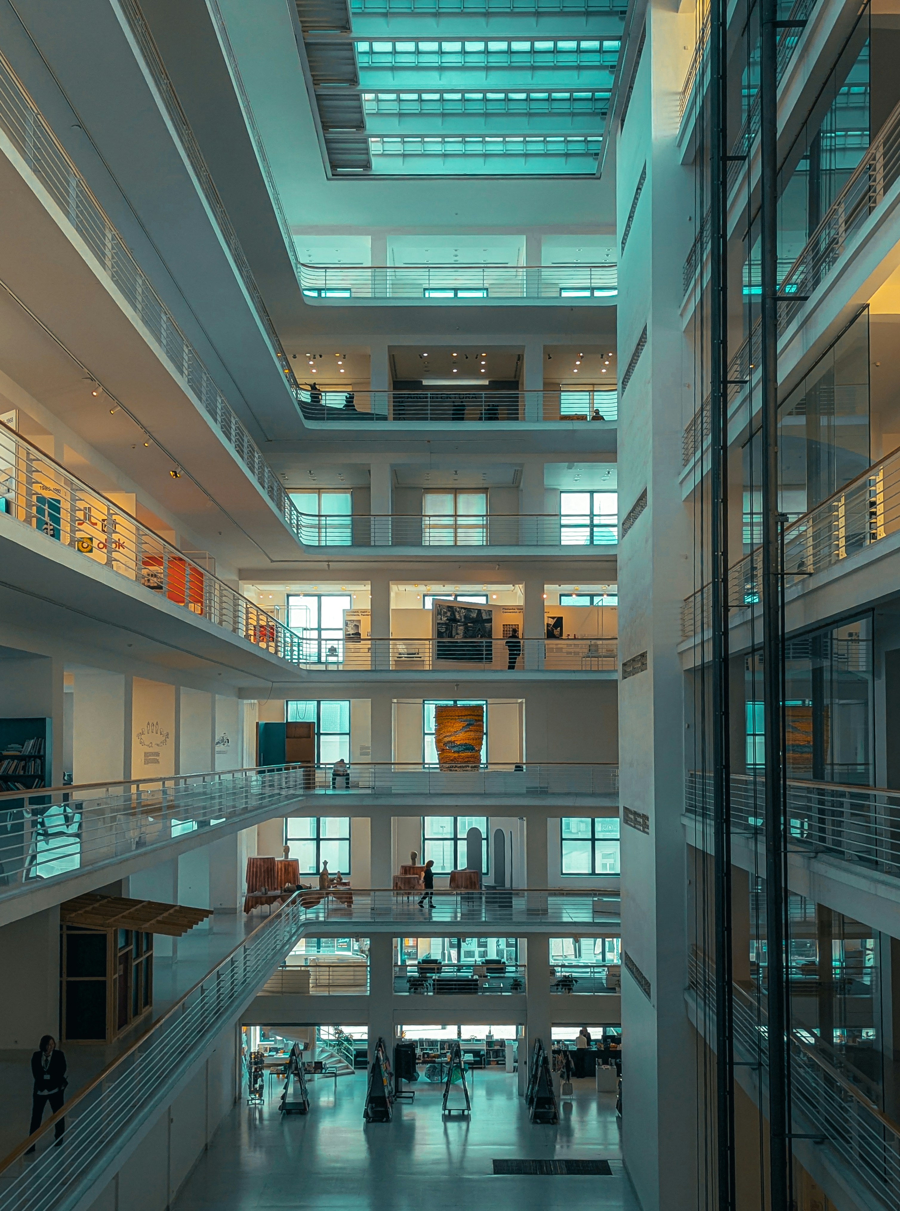Atrium Echoes: Vertical Ray of Light Through a Modern Courtyard
