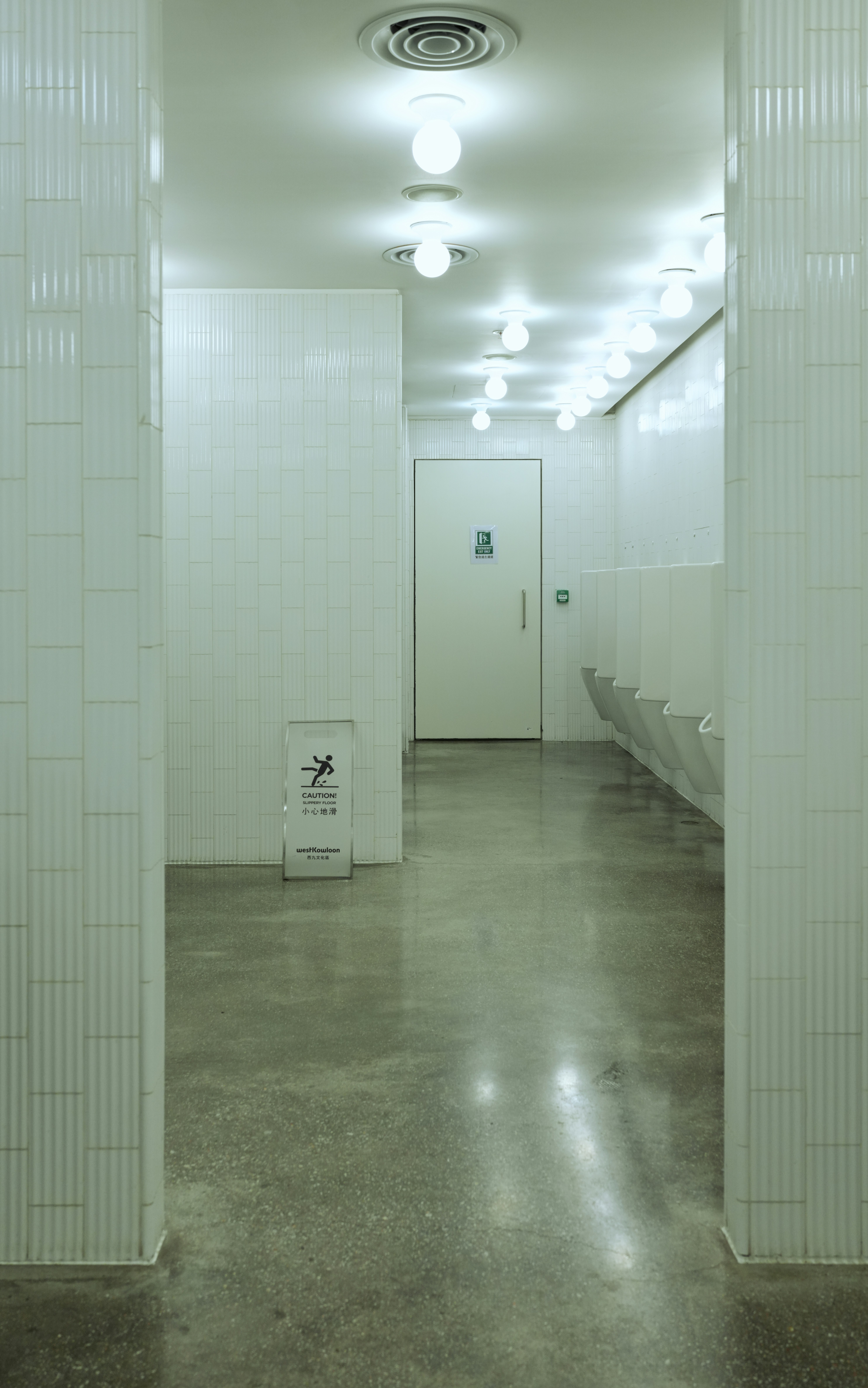 Sterile Corridor with Hovering Lights and Subtle Echoes