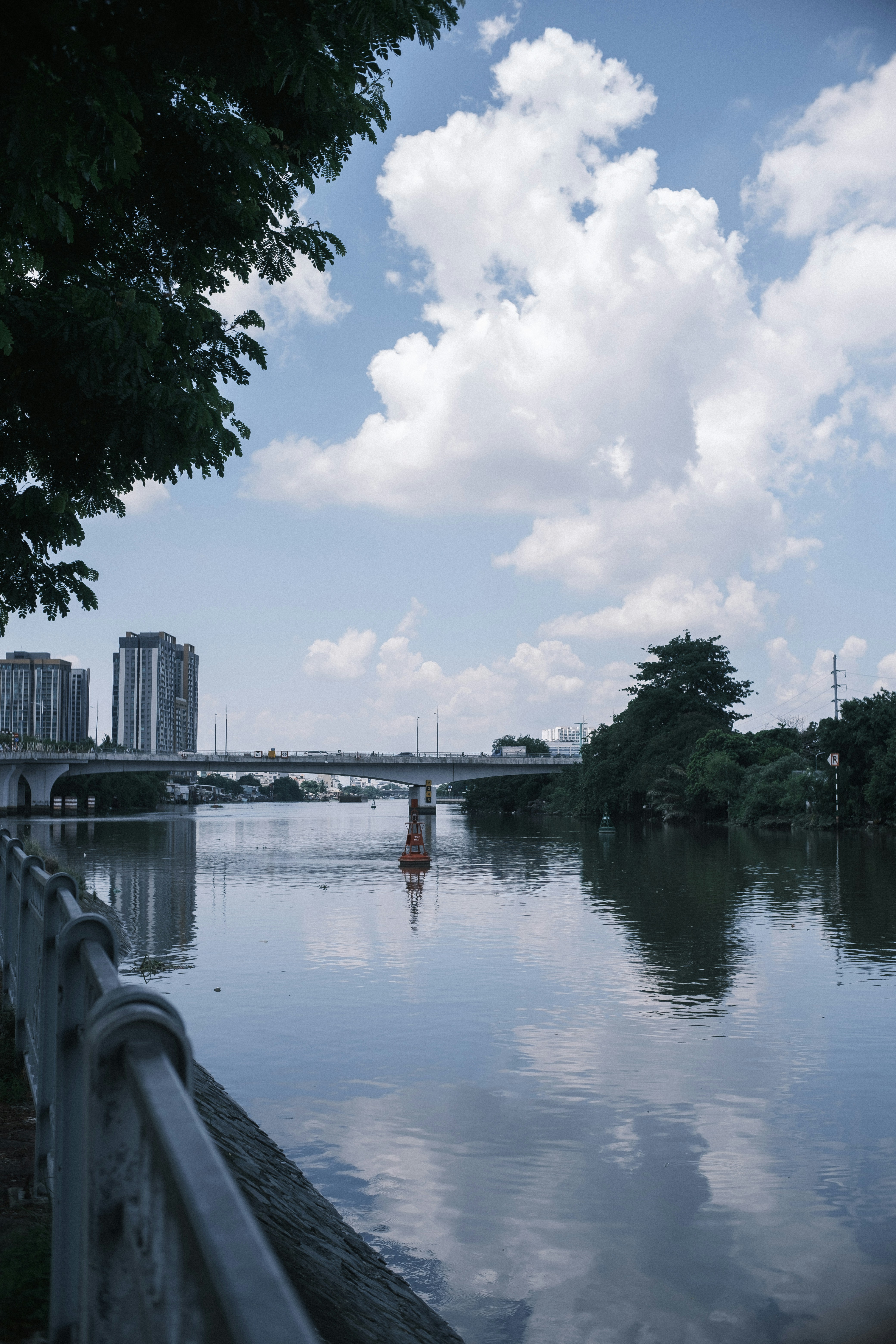  Riverside Reverie Under a Sky-Spread Bridge