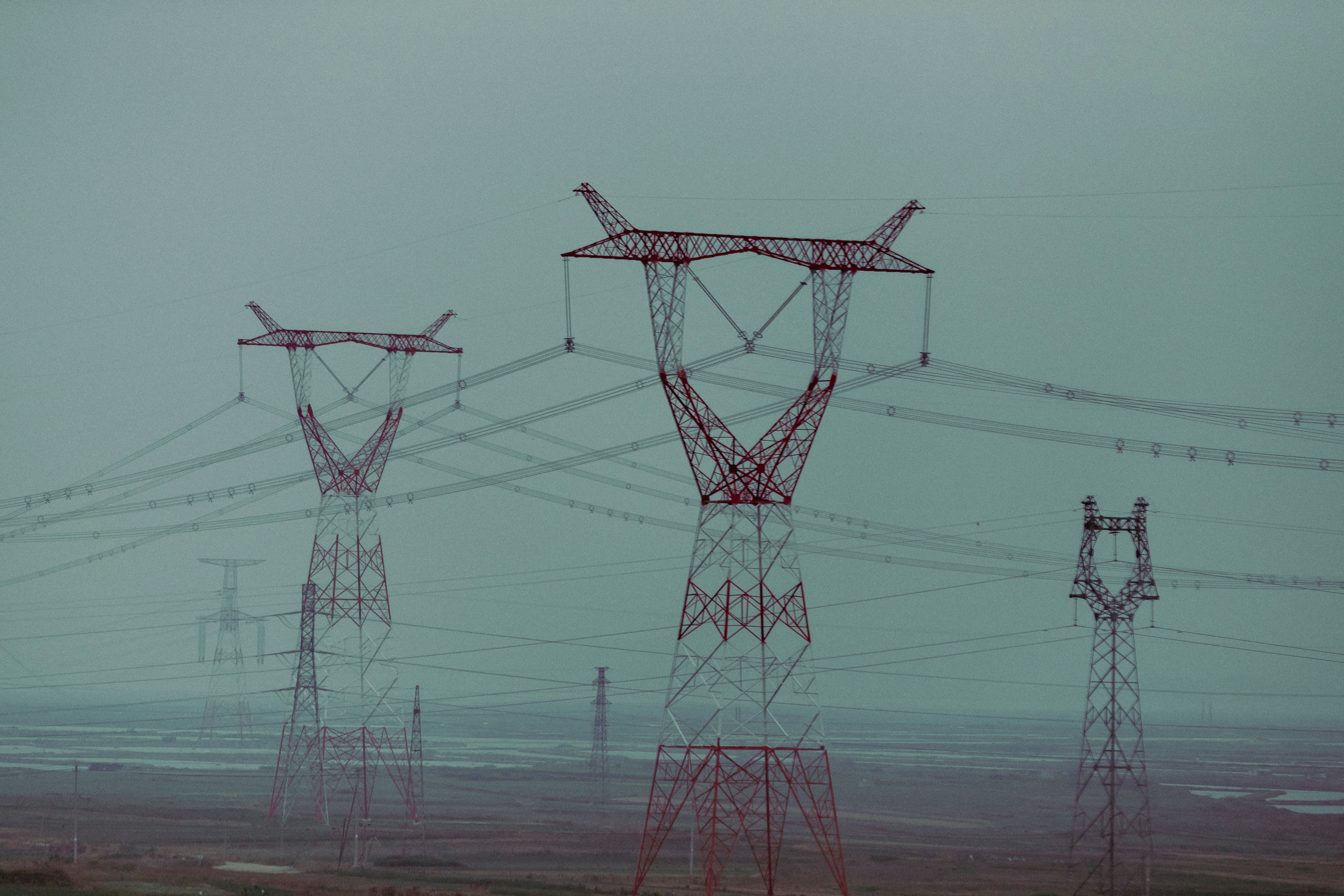 Overlooked Giants: Power Lines Carve a Quiet Horizon