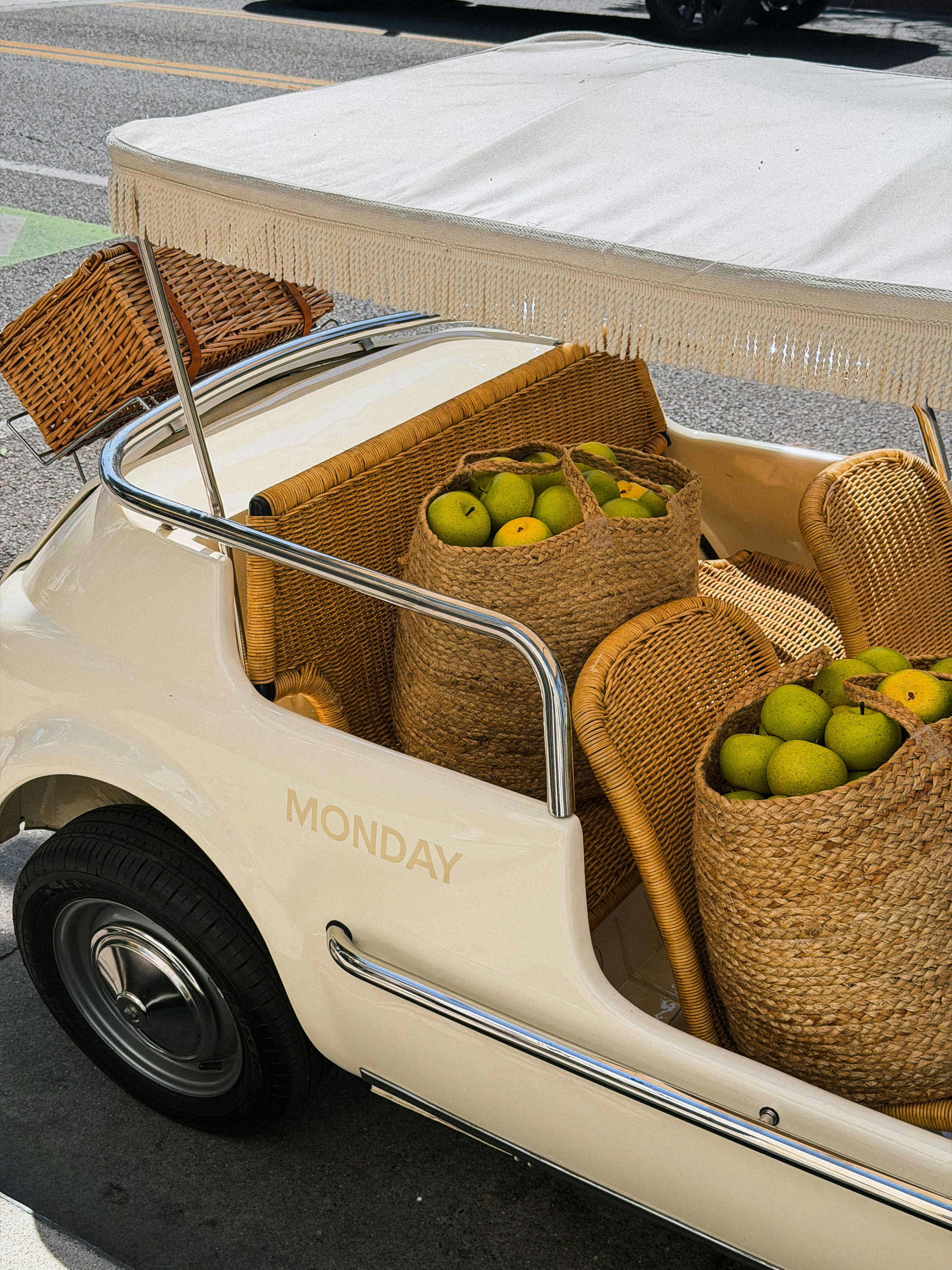 Basketed Citrus on a Cream Vintage Car