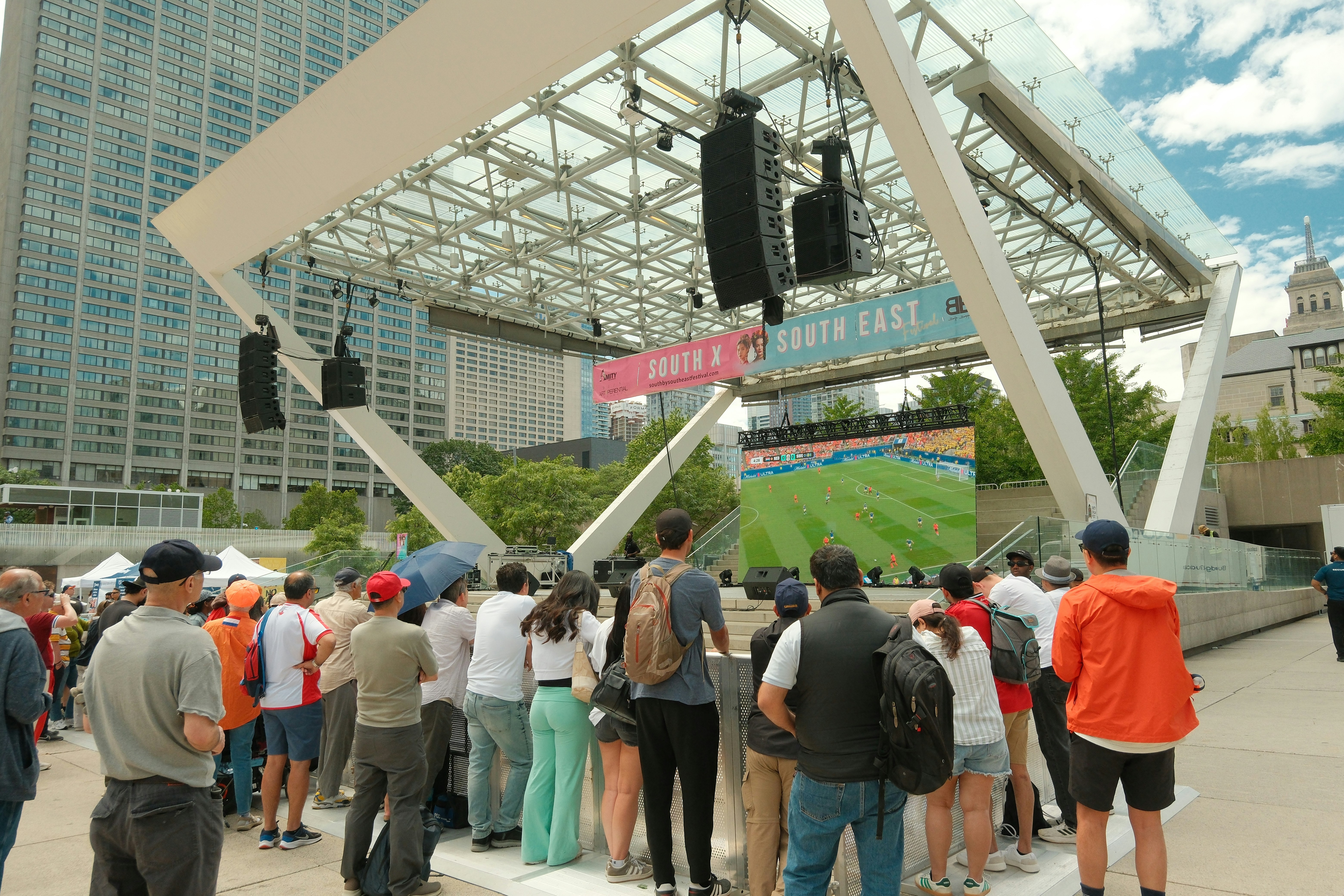 Stadium Stage: Crowd Gathers for Outdoor Screen Debut