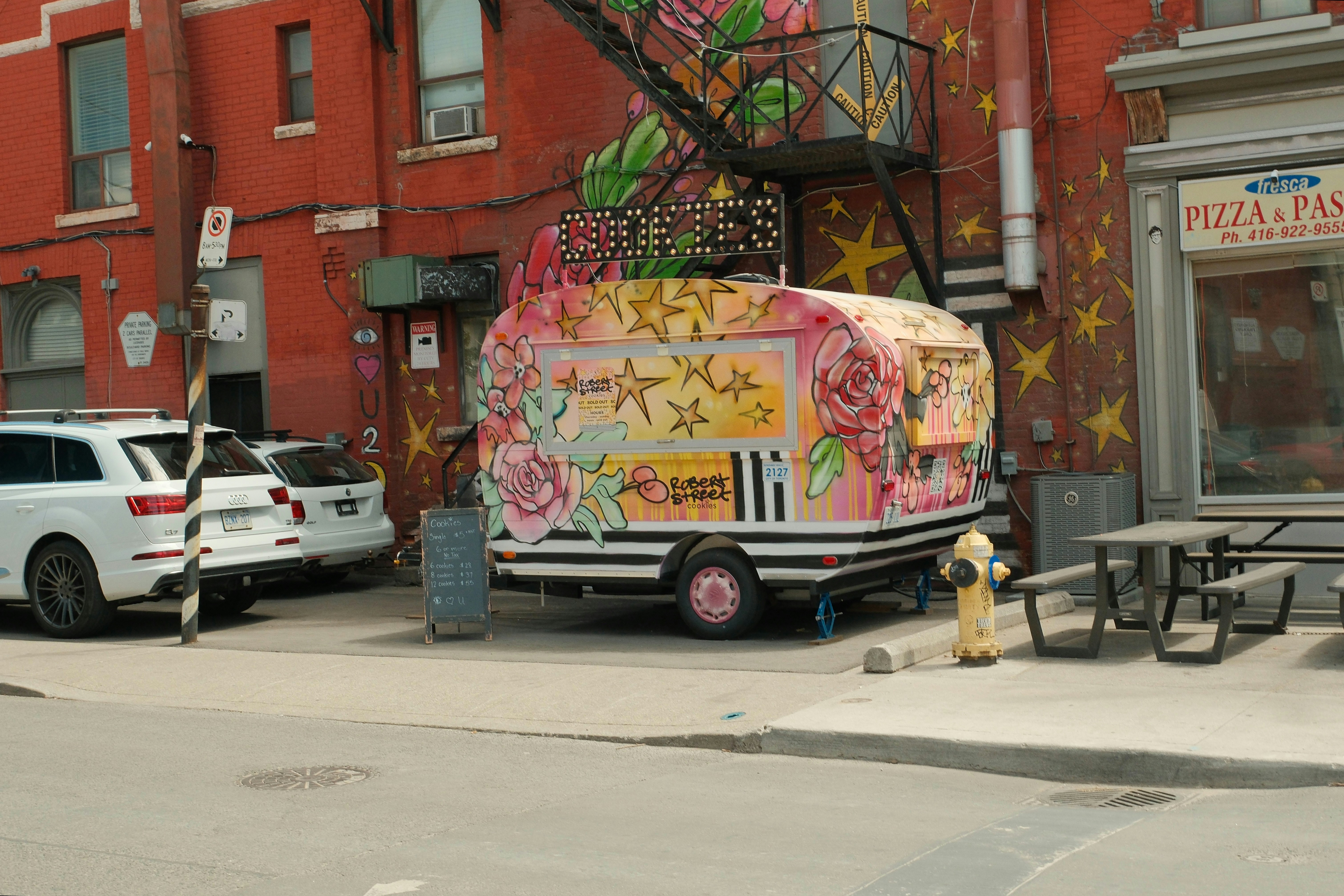 Painted Food Truck Oasis on a Quiet City Block