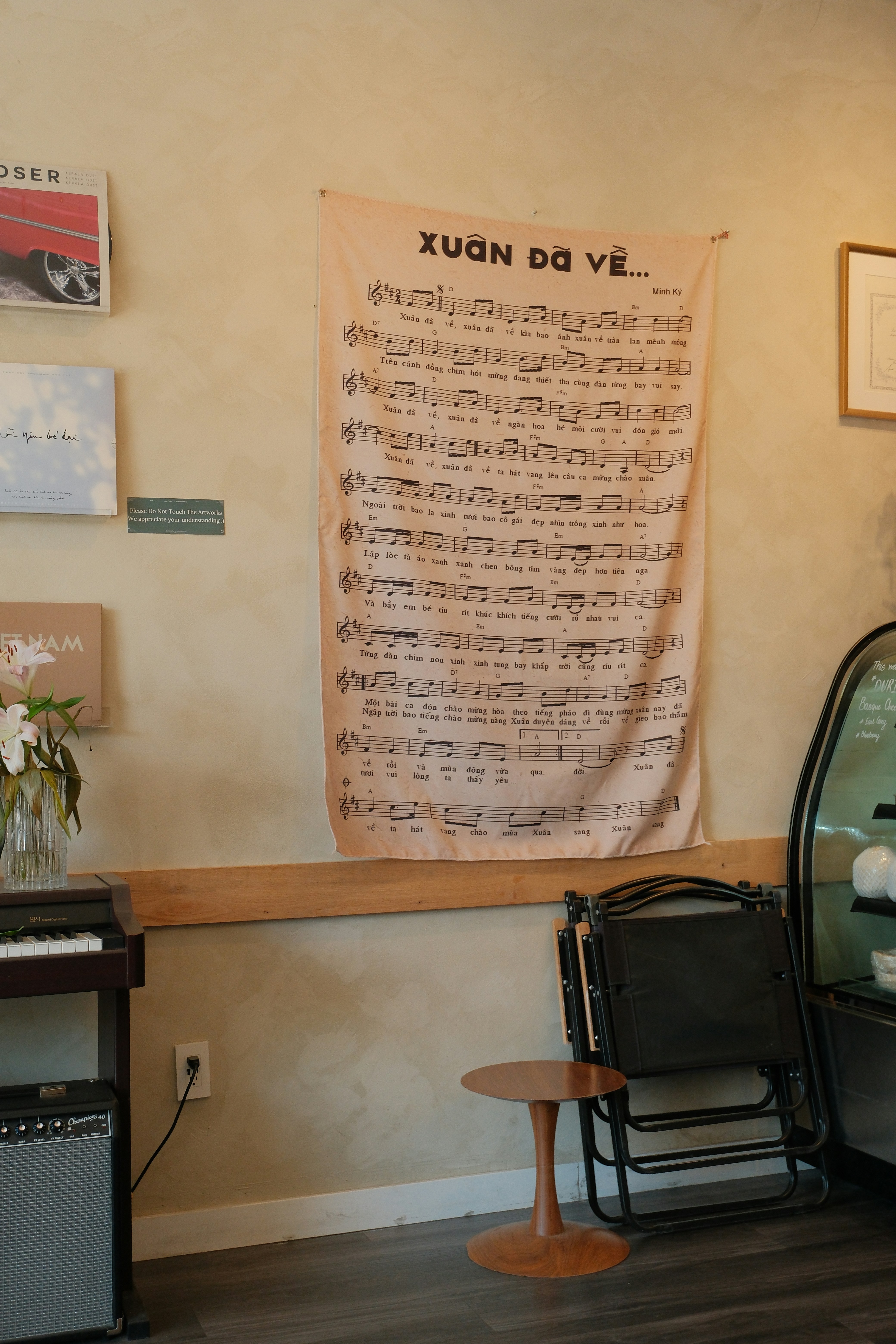 Hanging Sheet Music in a Quiet Studio Corner
