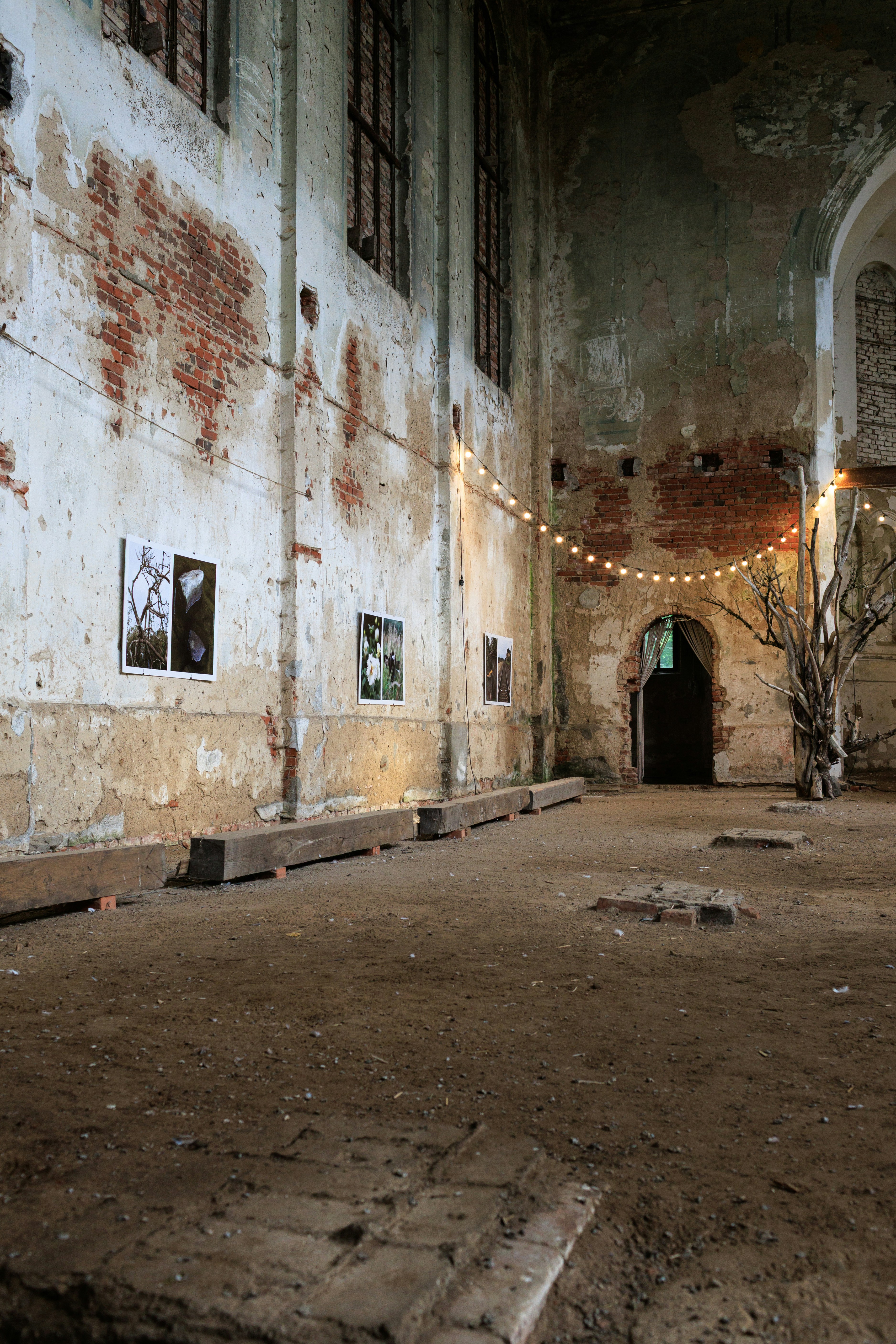 String of Lights in a Ruined Hallway: Echoes of an Art Walk