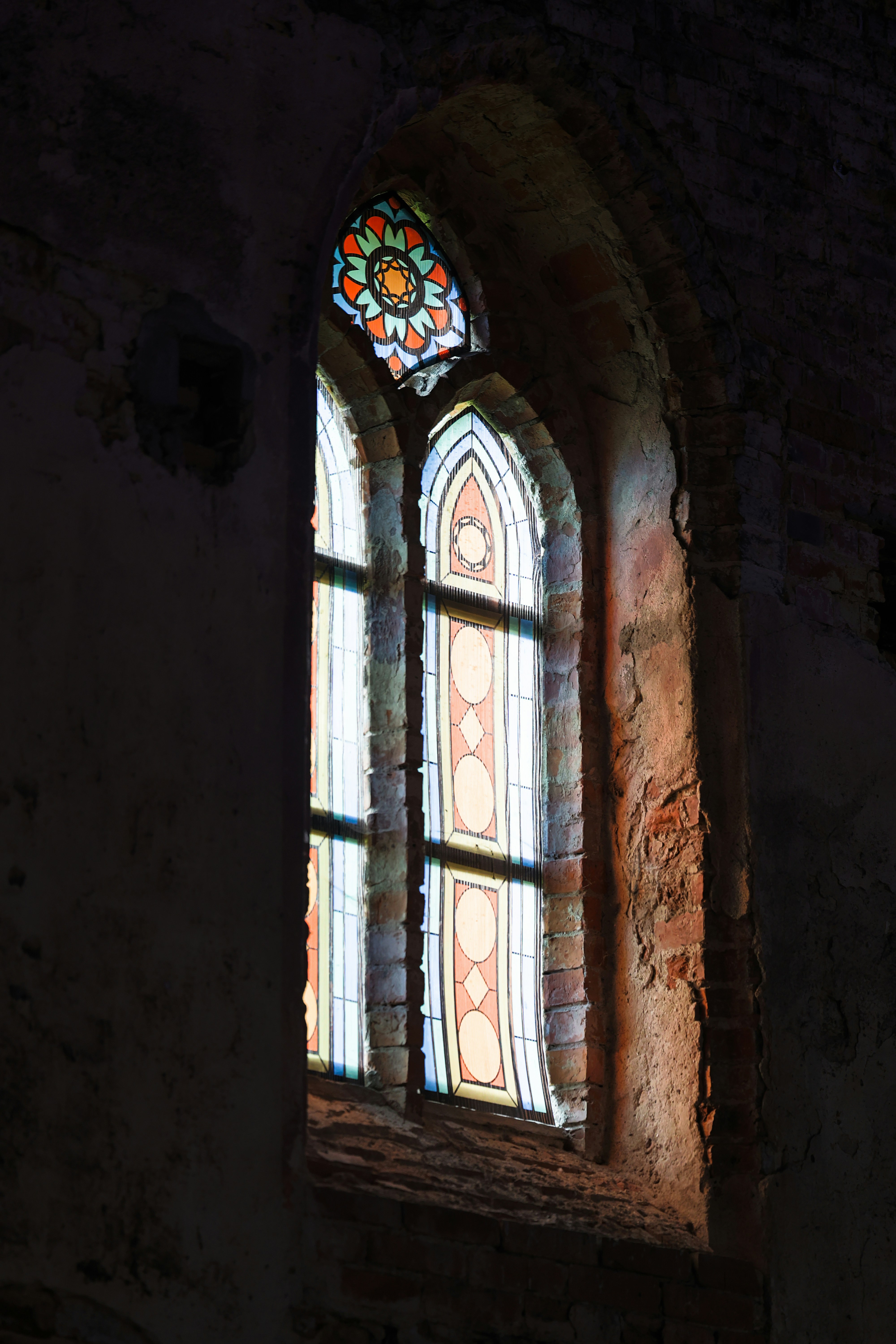 Stained Glass Archlet: Sacred Light through a Timeworn Window