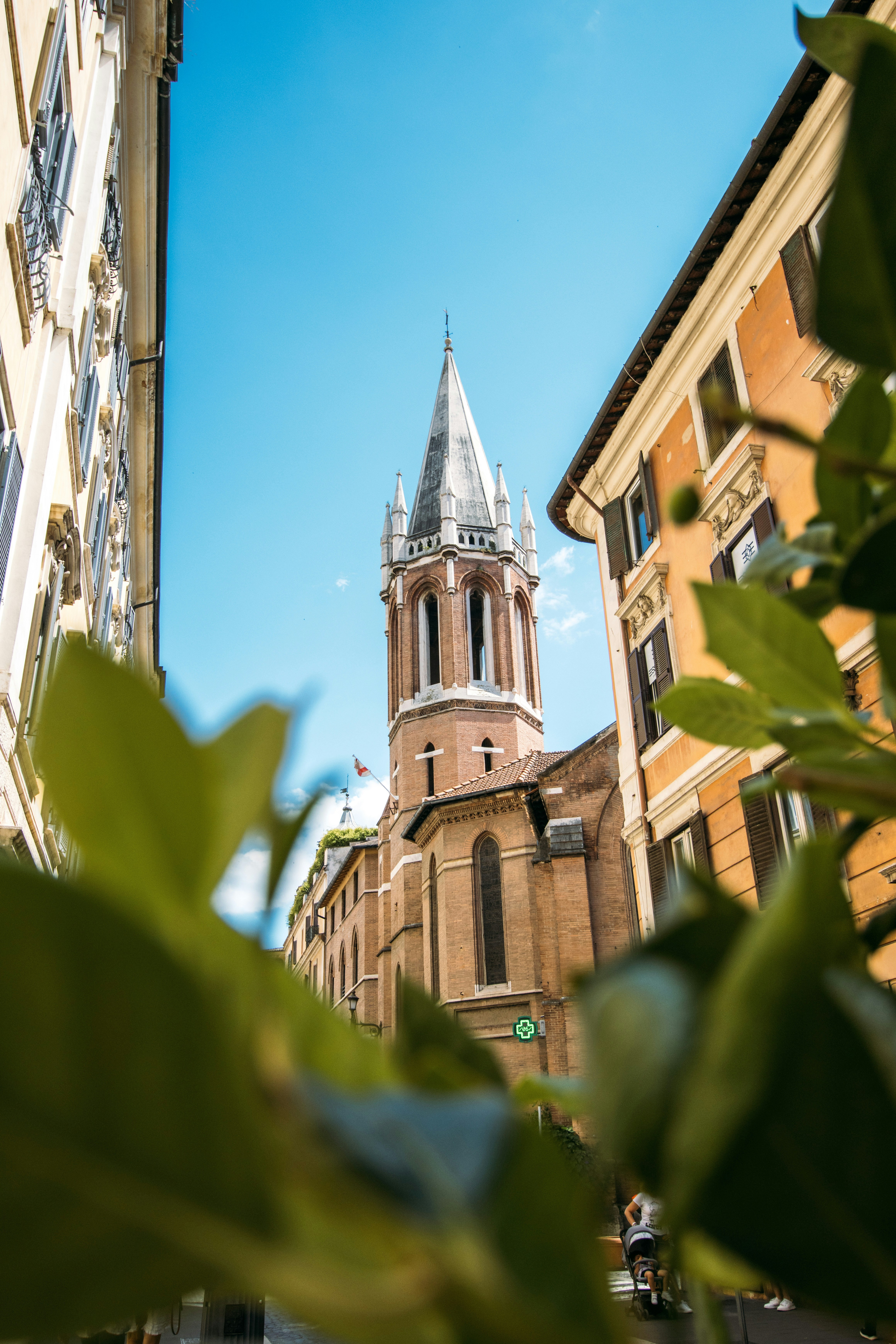 Bell Tower Between City Façades