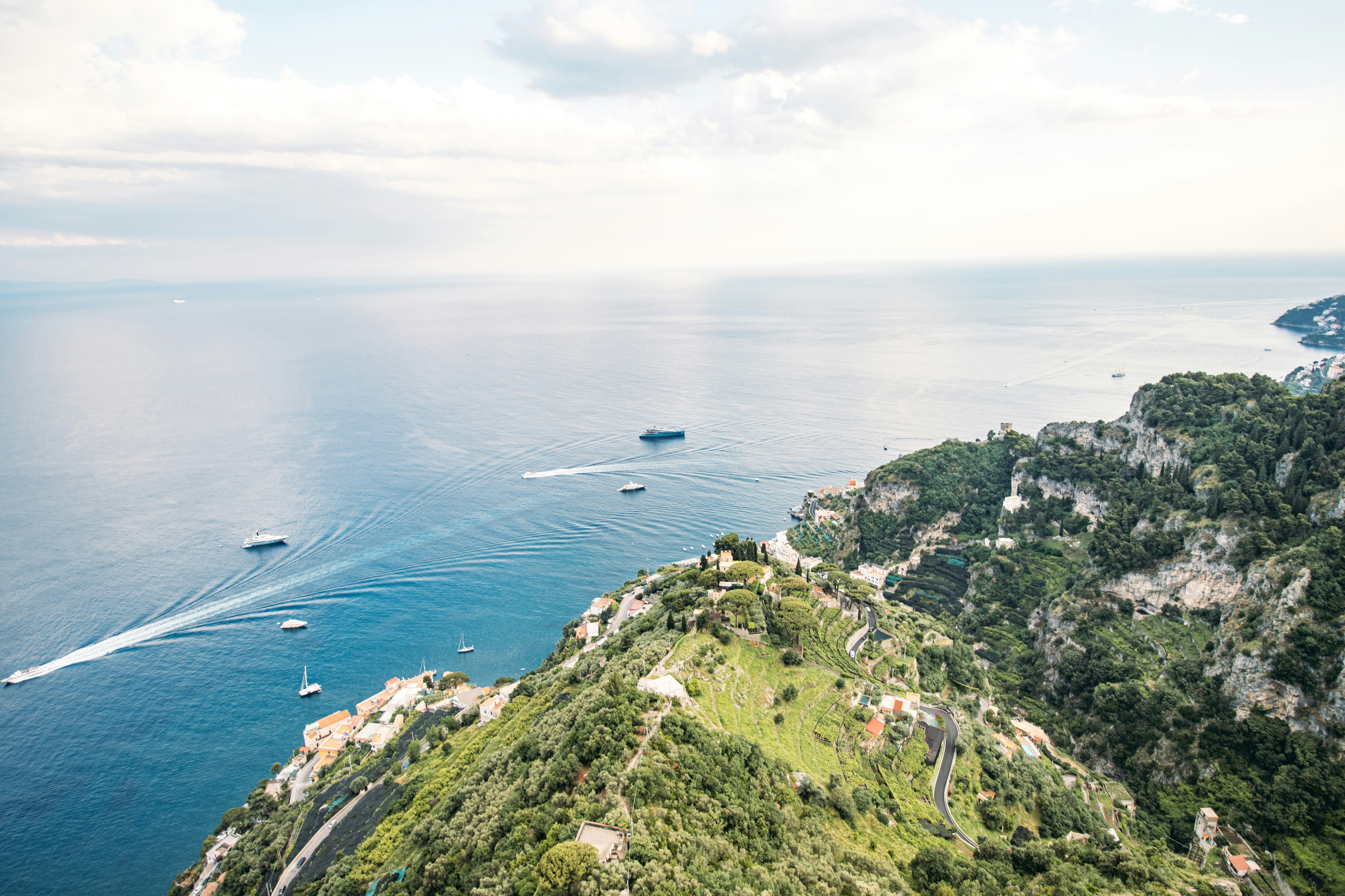 Cliffside Riviera: Aerial Vistas Over the Lapping Blue