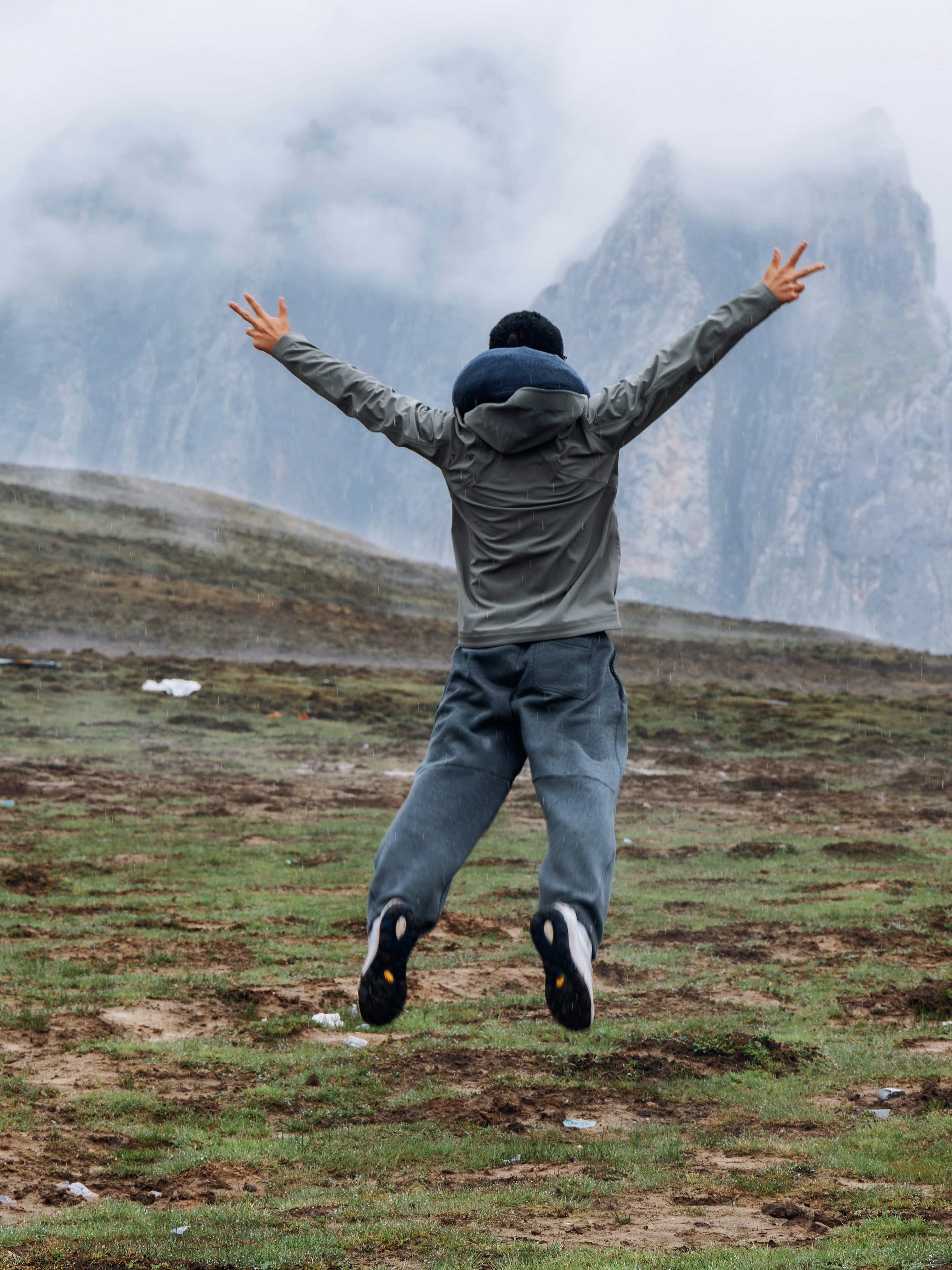 Leap Against the Alpine Sky: A Moment of Freedom