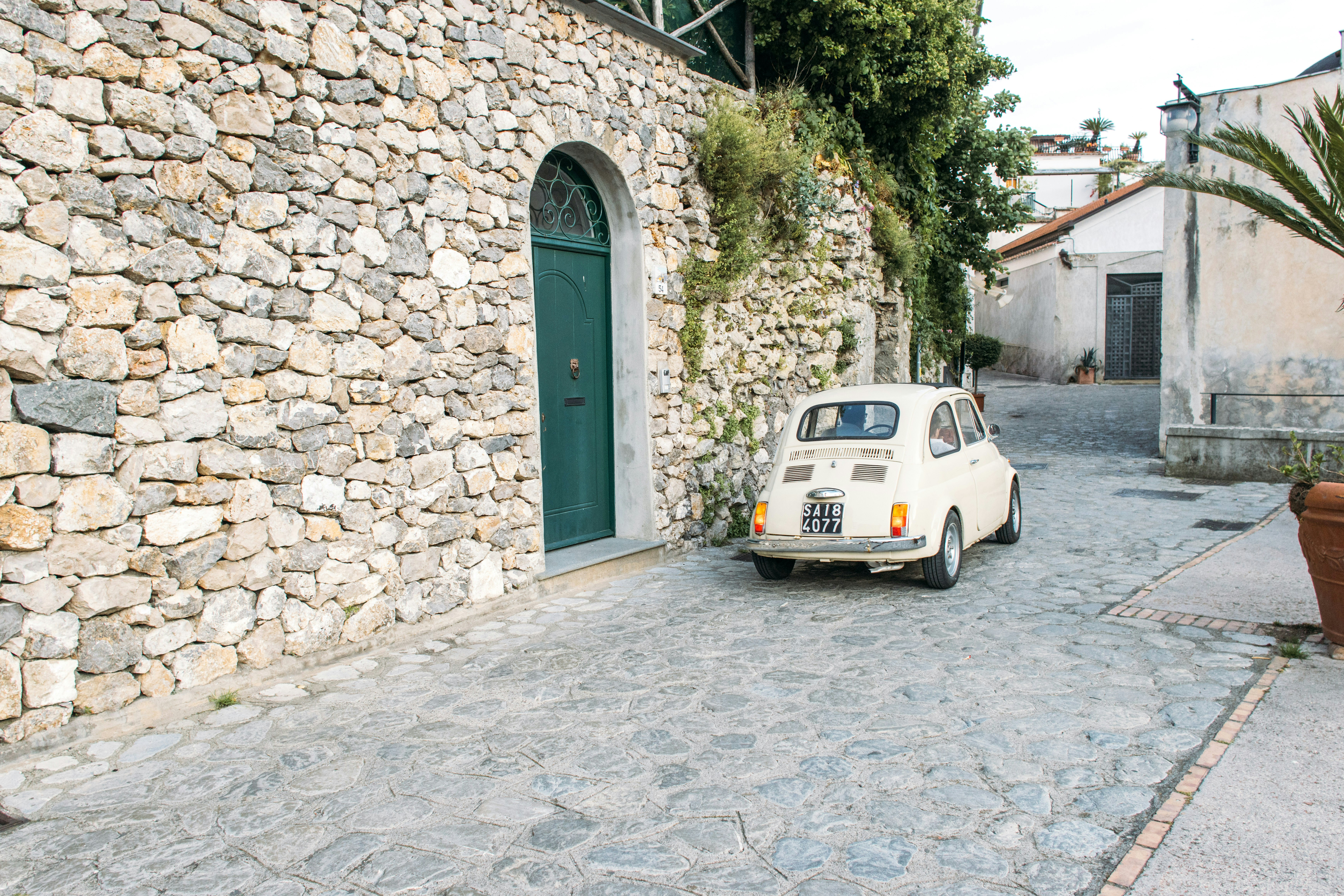 A Quiet Sicilian Lane: The Petite Classic in Cobblestone Light