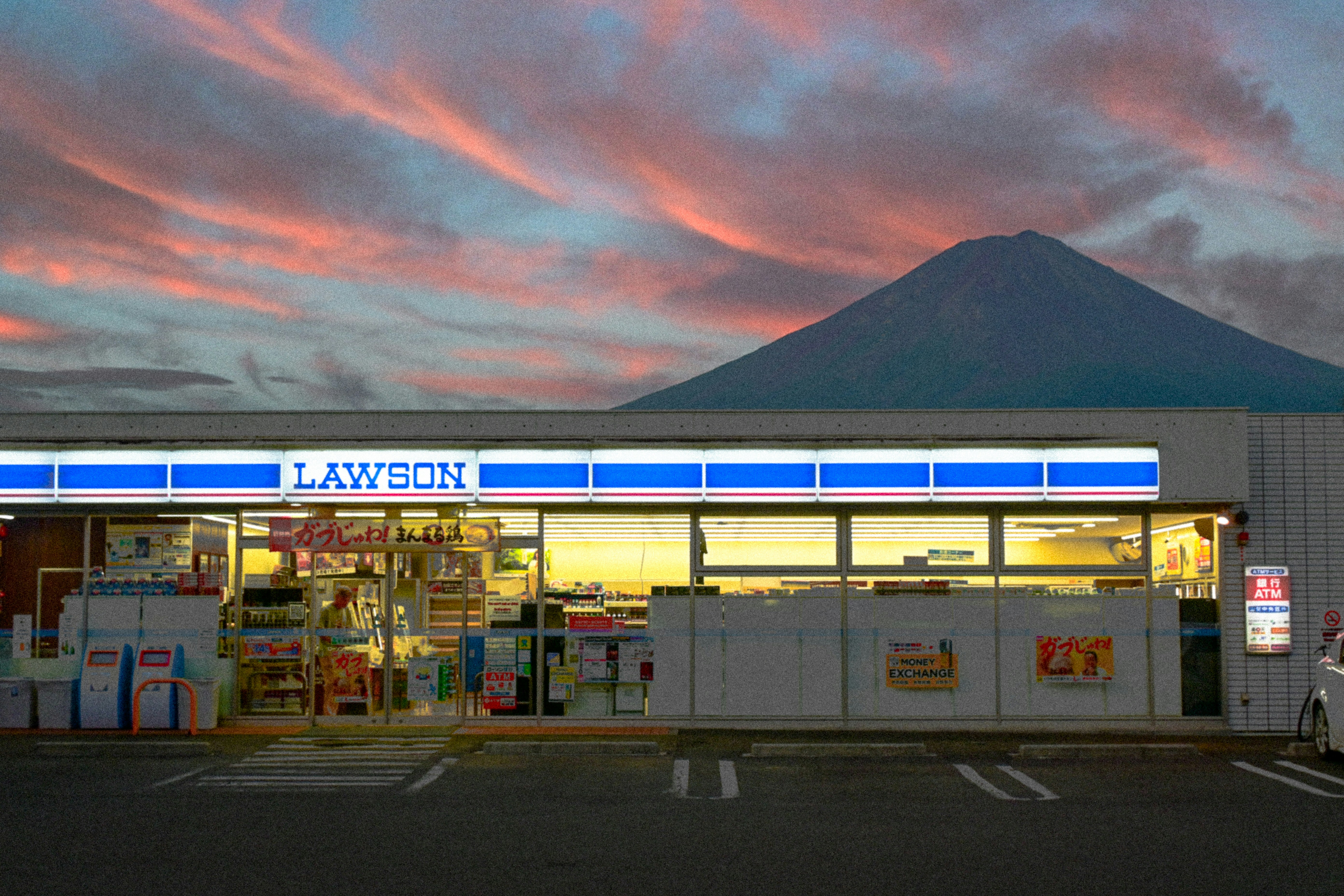 Evening Glow Over a Convenience Store by the Mountain