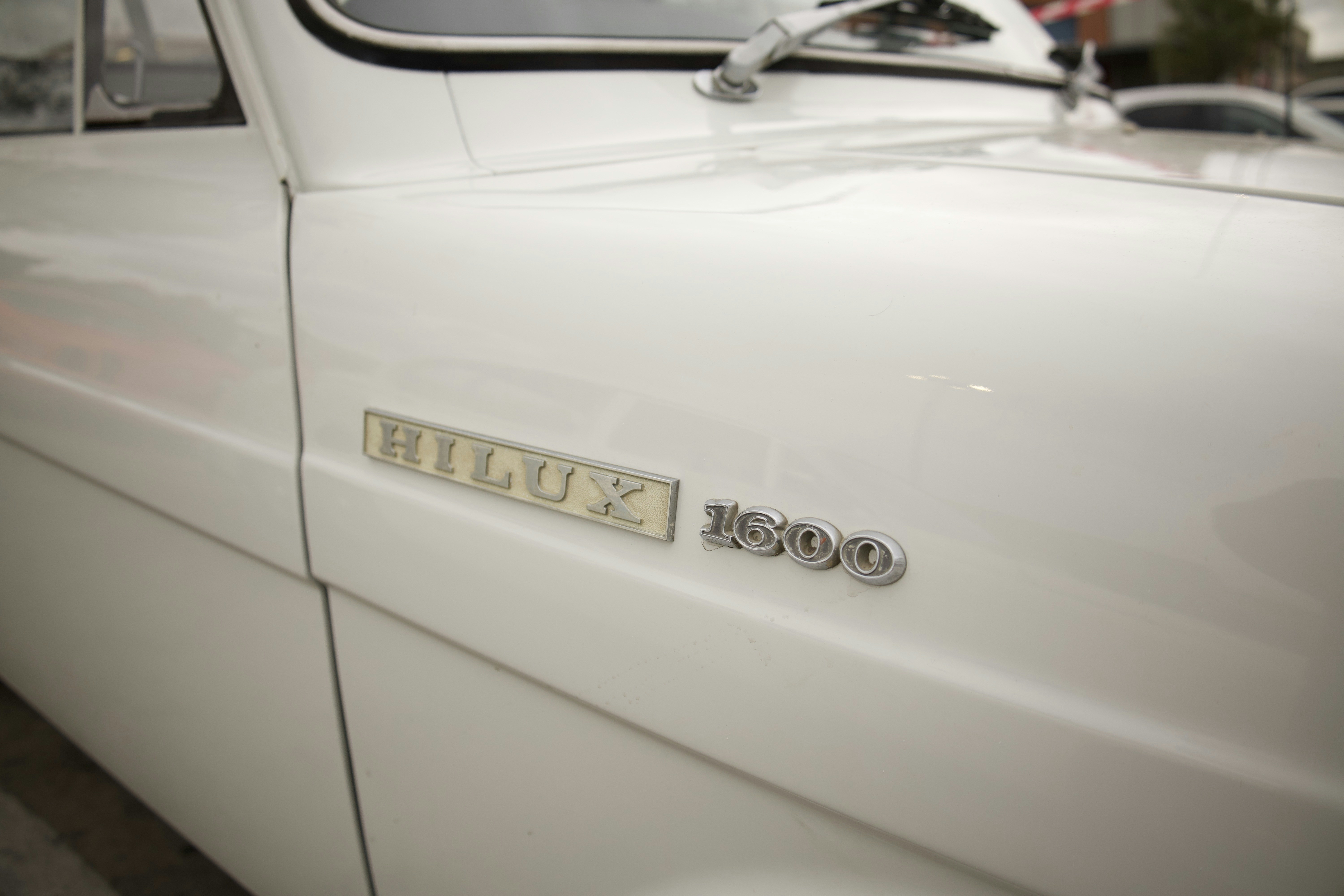 Vintage Chevy Emblem on a White Door Panel