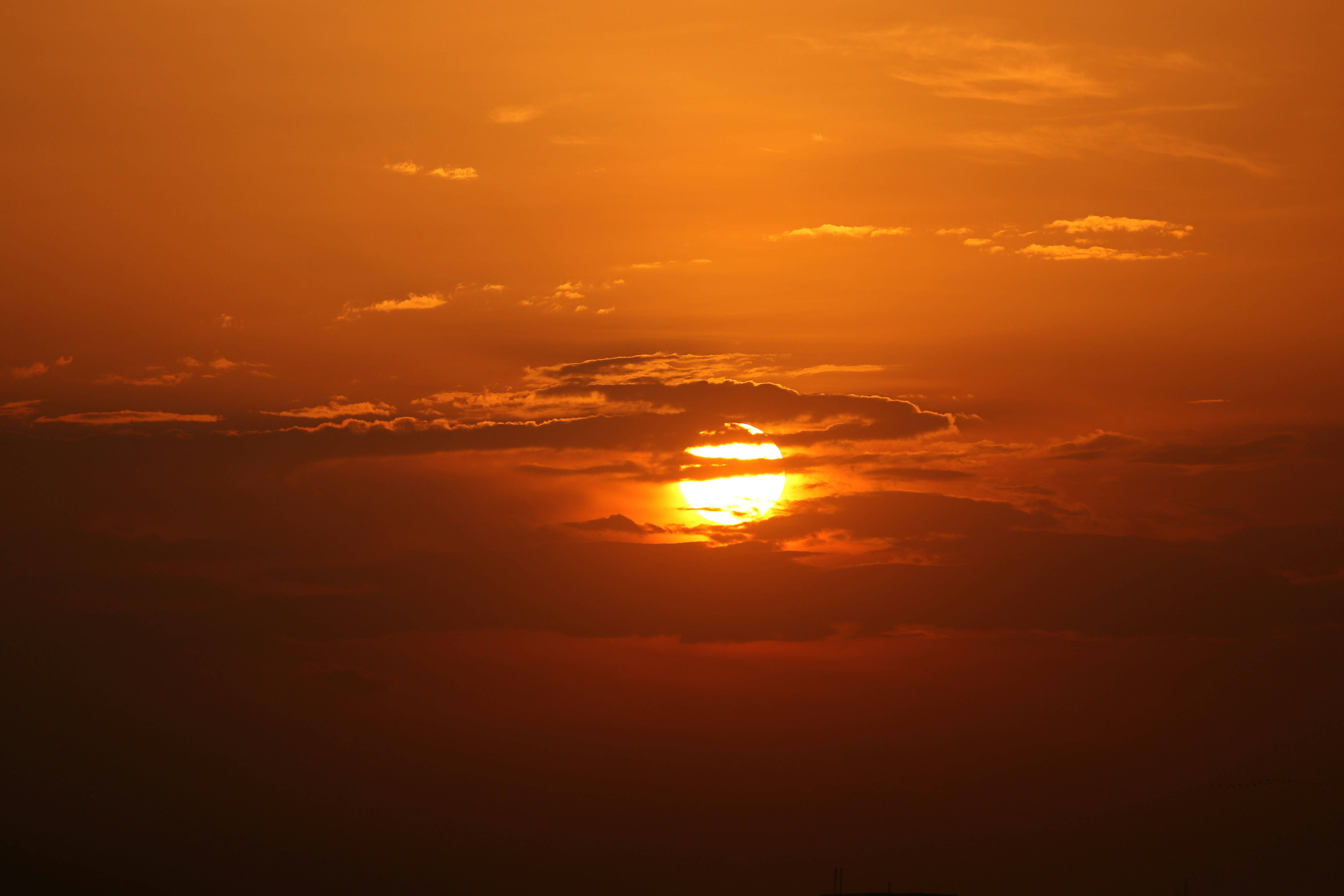 Sunlit Edge: A Quiet Dusk Over The Horizon