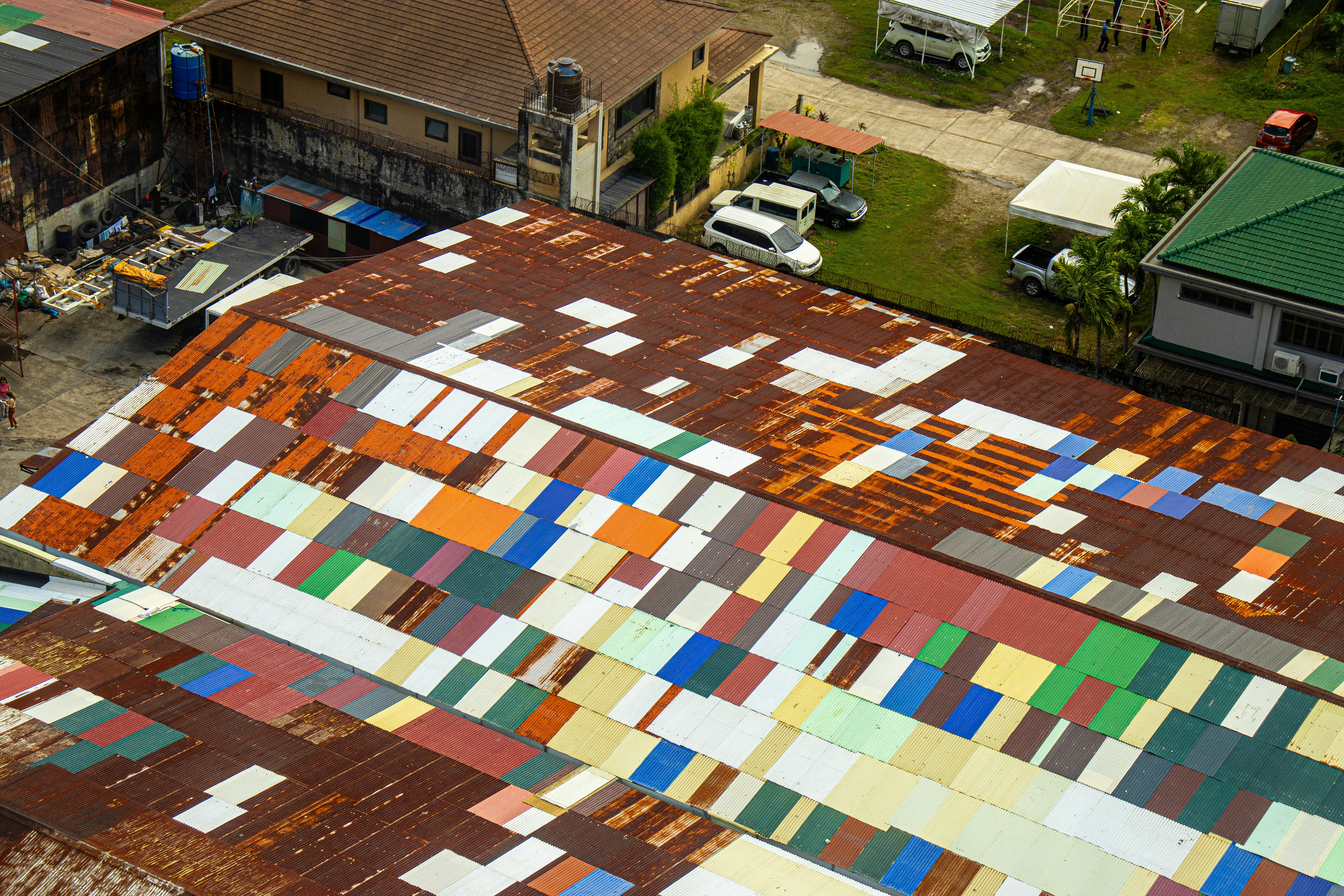Colorful Cargo Roof: Aerial Patchwork of Shipping Containers