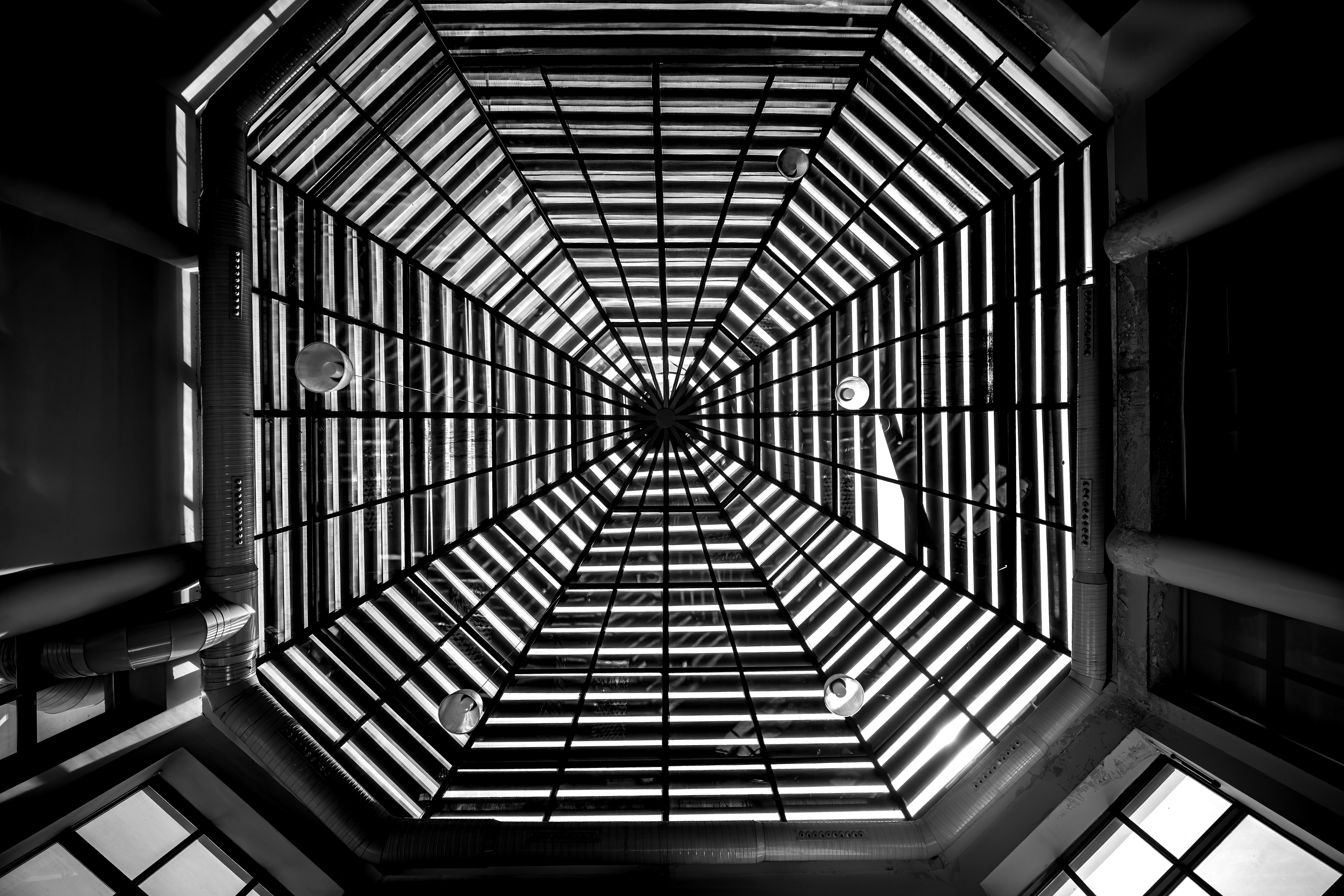 Hexagonal Atrium: Converging Lines Toward a Central Void