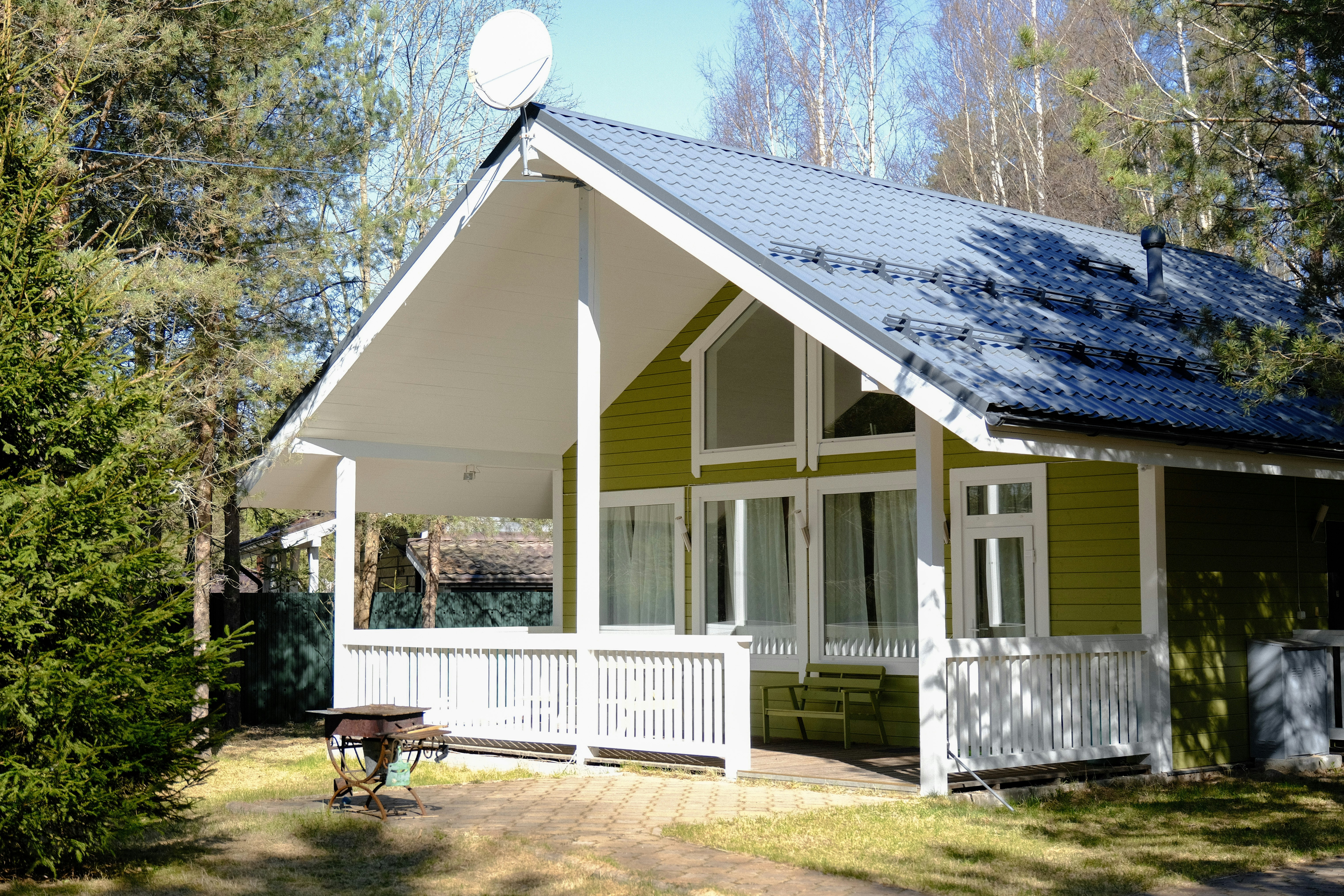 Solar-lit Chalet: A Quiet Finnish-style Cabin in a Sun-Dappled Clearing