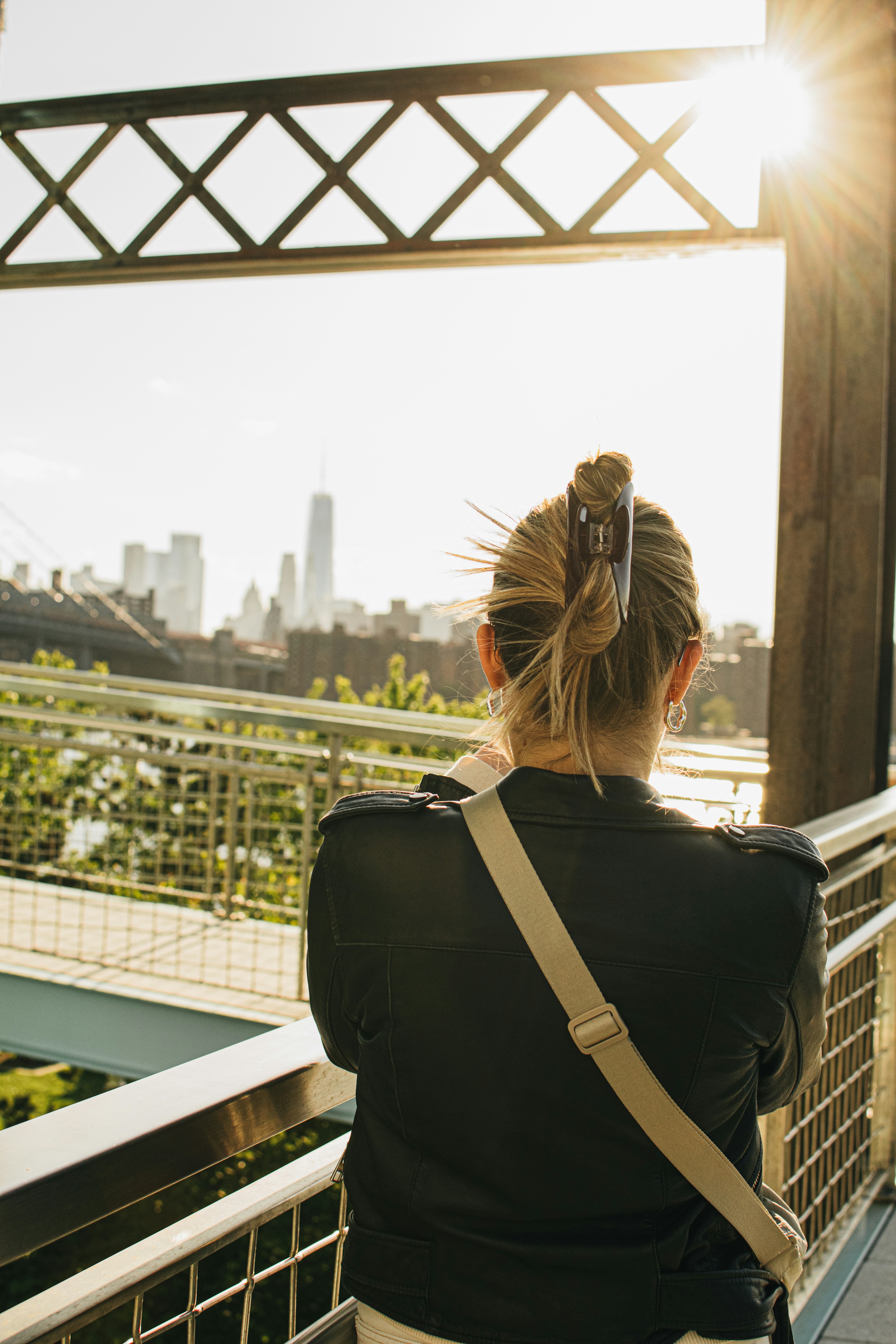 Backlit Boundary: A Portrait on the Riverwalk