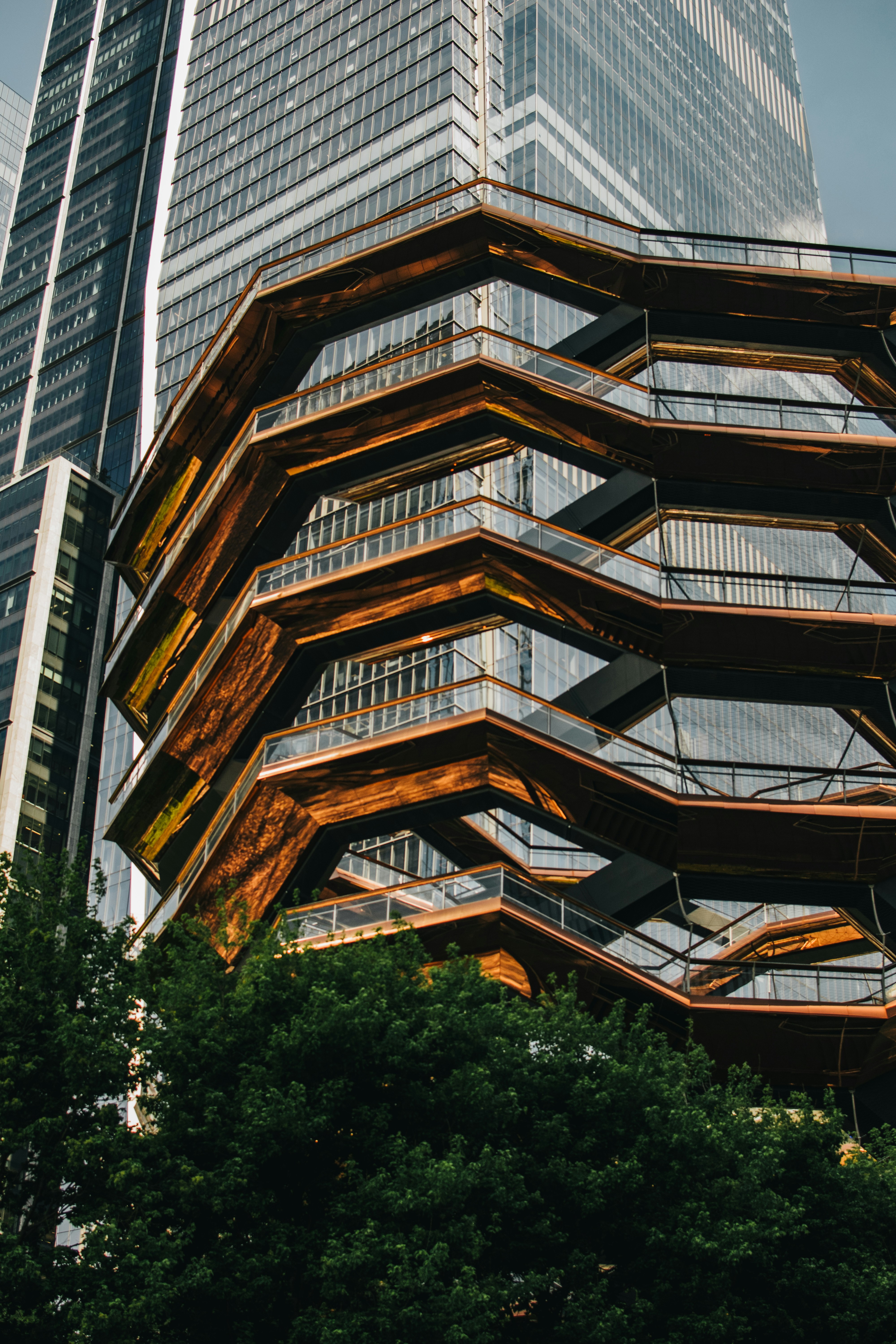 Copper Ramp Echoing Through Glass Skyscrapers