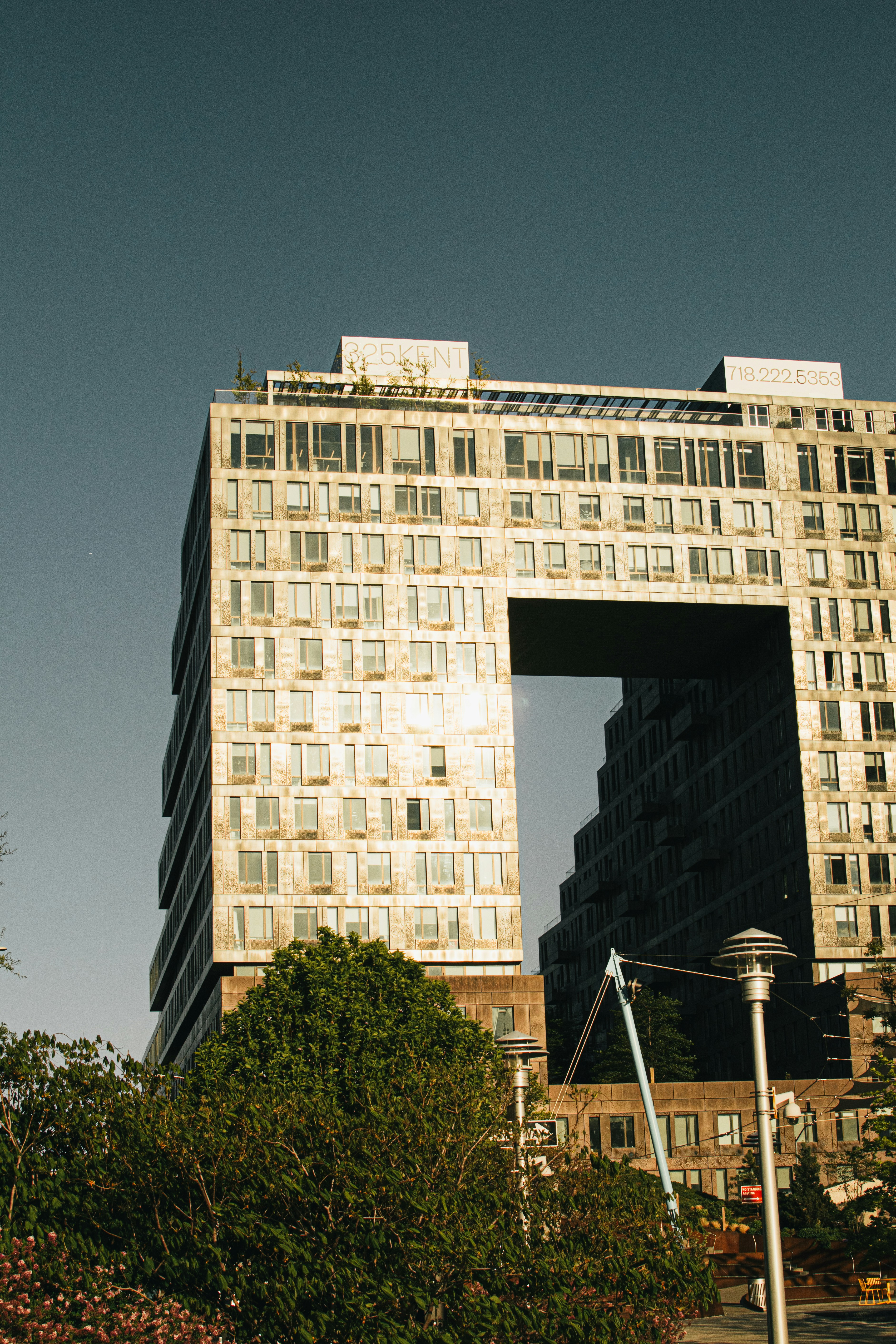 Sky-arched Office Block: A Perforated Gateway Framing the City