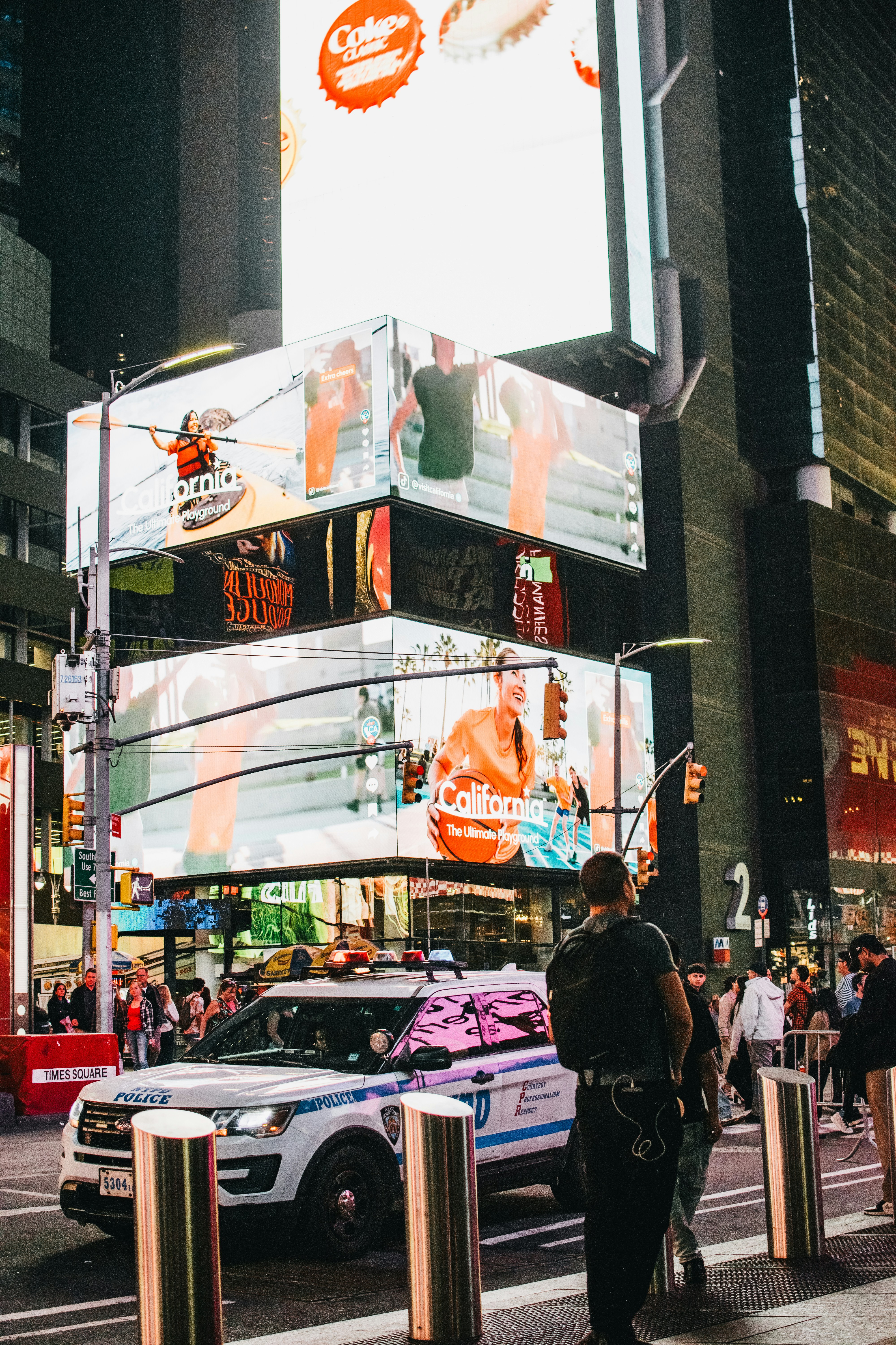 Neon Pulse: Times Square Face-Off in a Rainlit City