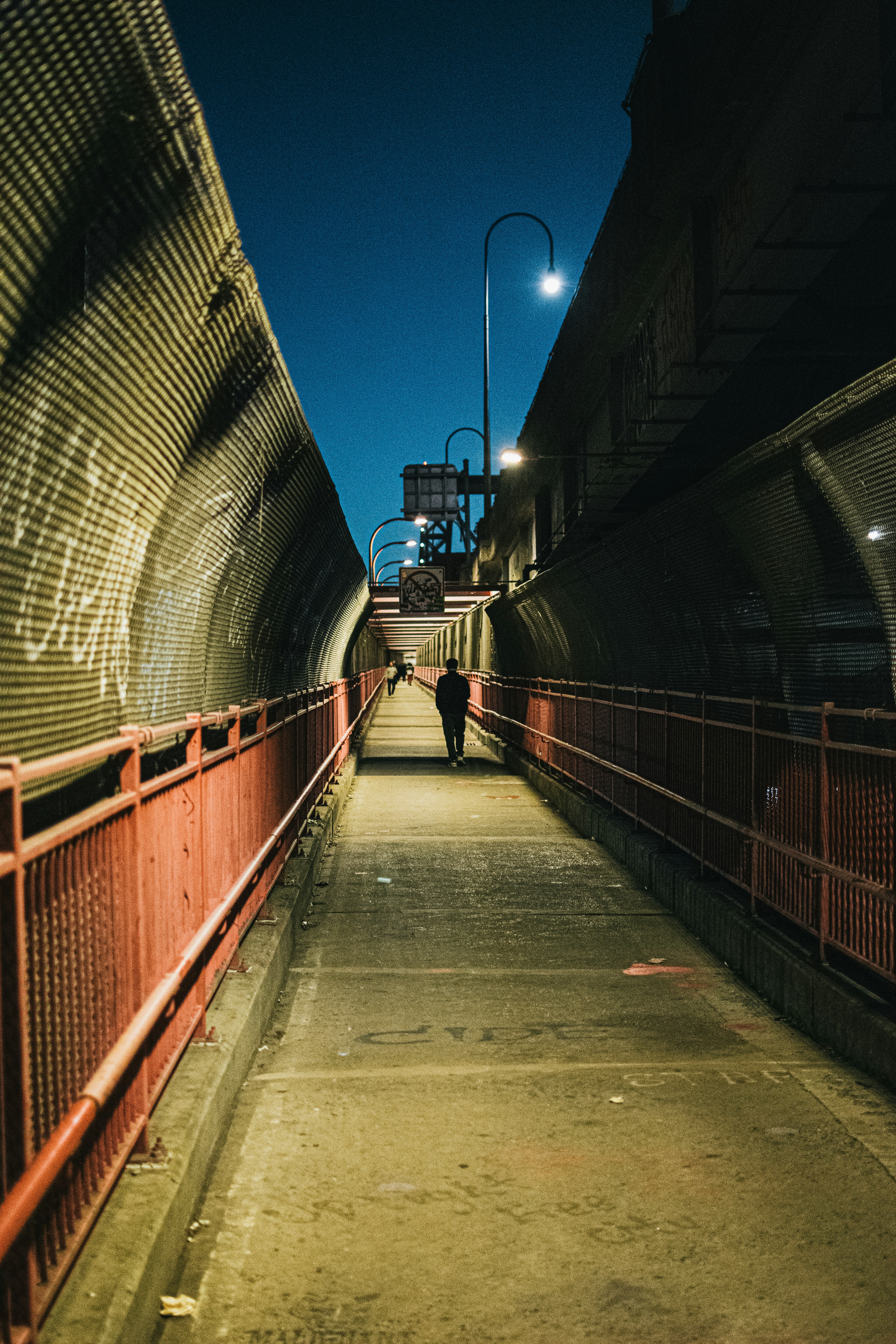 Midnight Walk Under the Urban Tunnel Lights