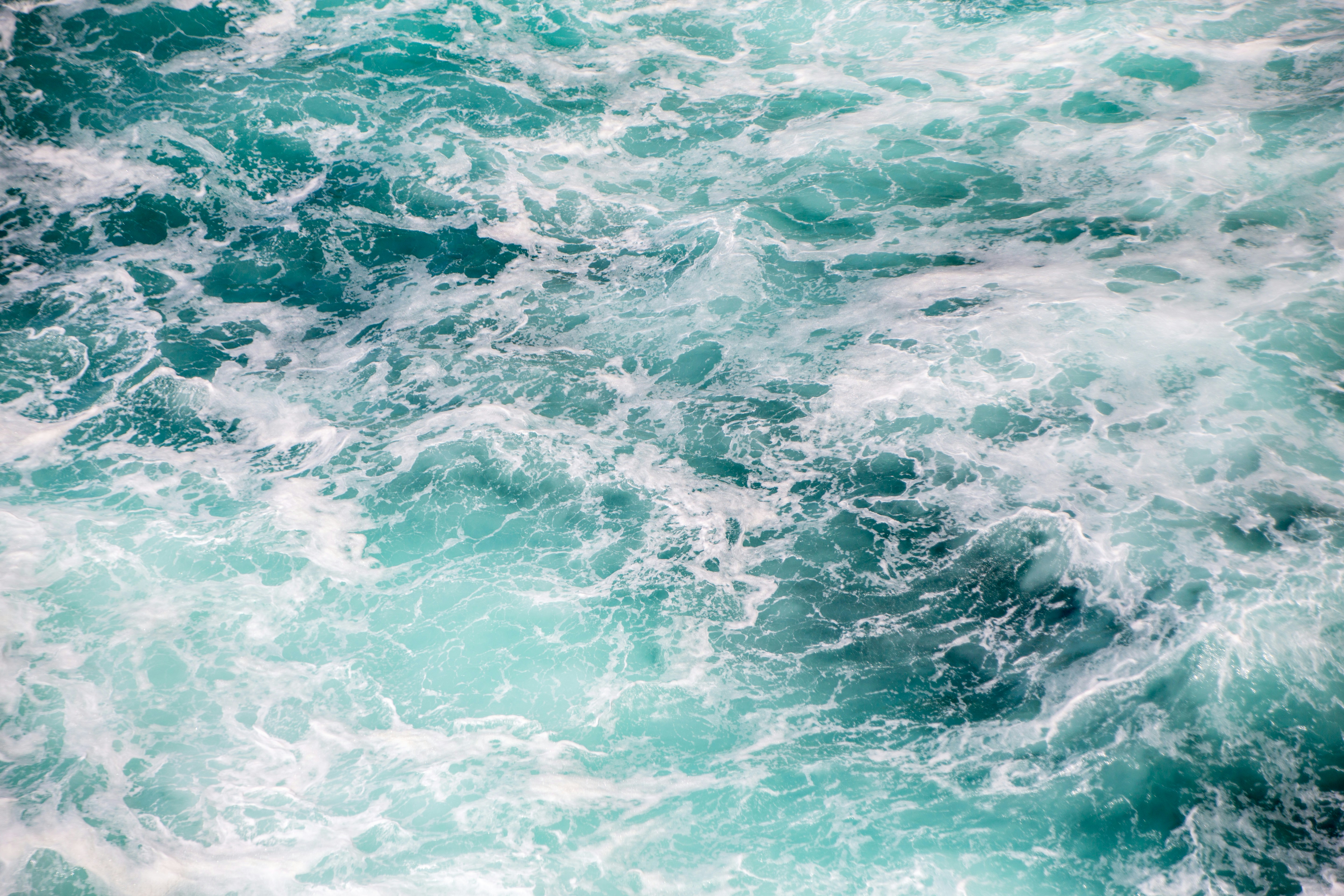 Aqua Turbulence: Whirl of Turquoise and White