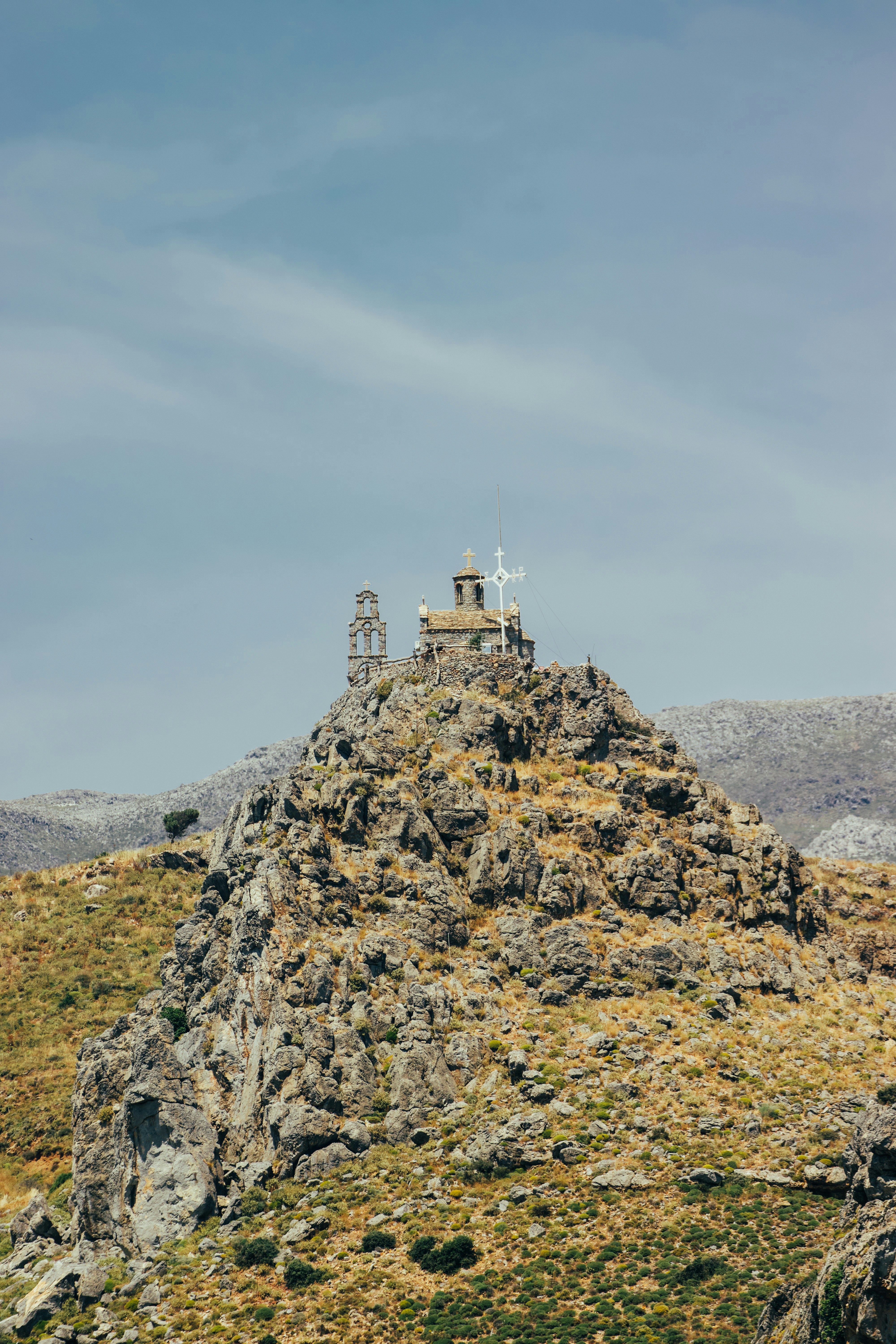 On a Pillar of Stone: A Hilltop Chapel Crowned by Weathered Crosses