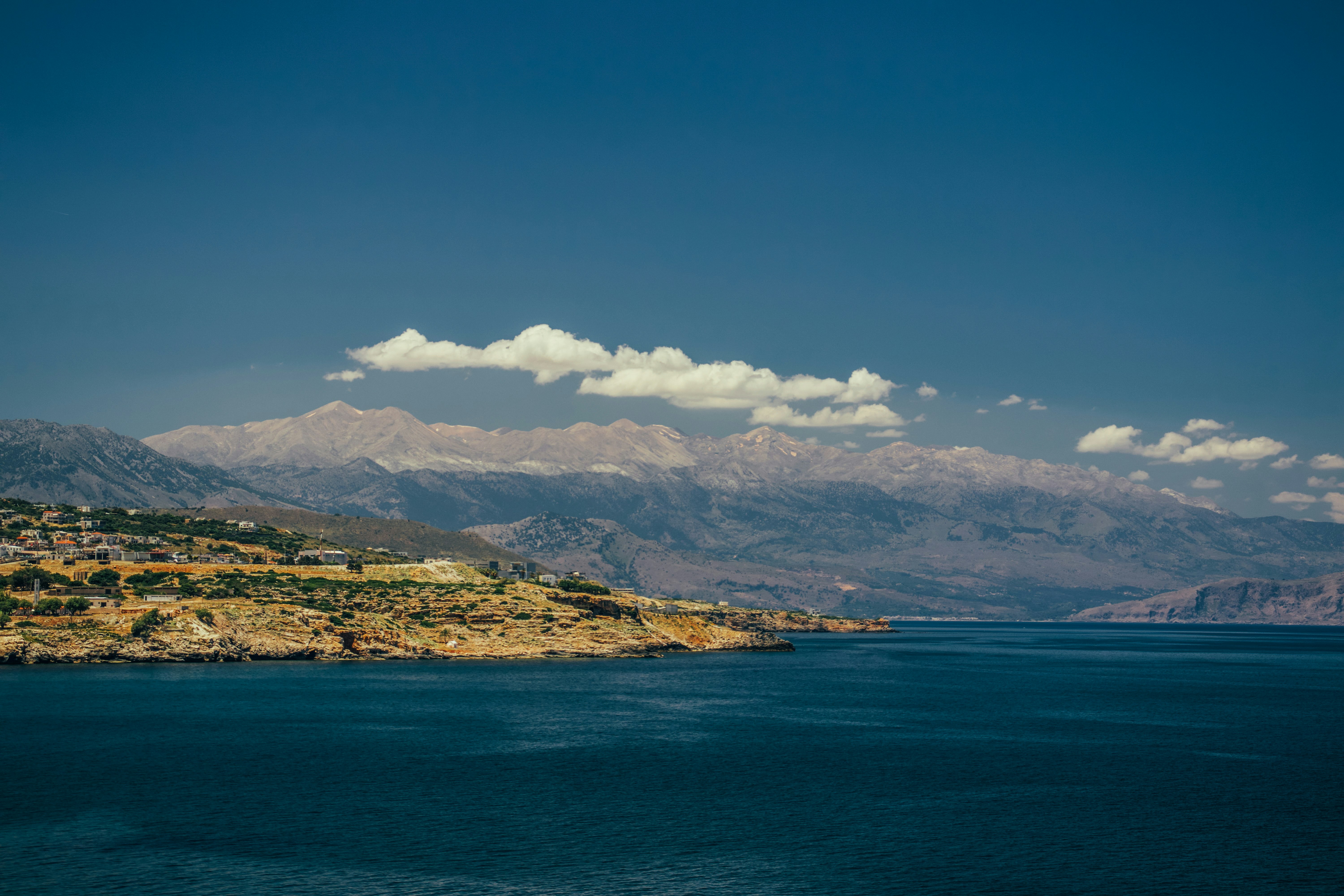 Coastal Cliffline Beneath a Gap of Mountain Luminance