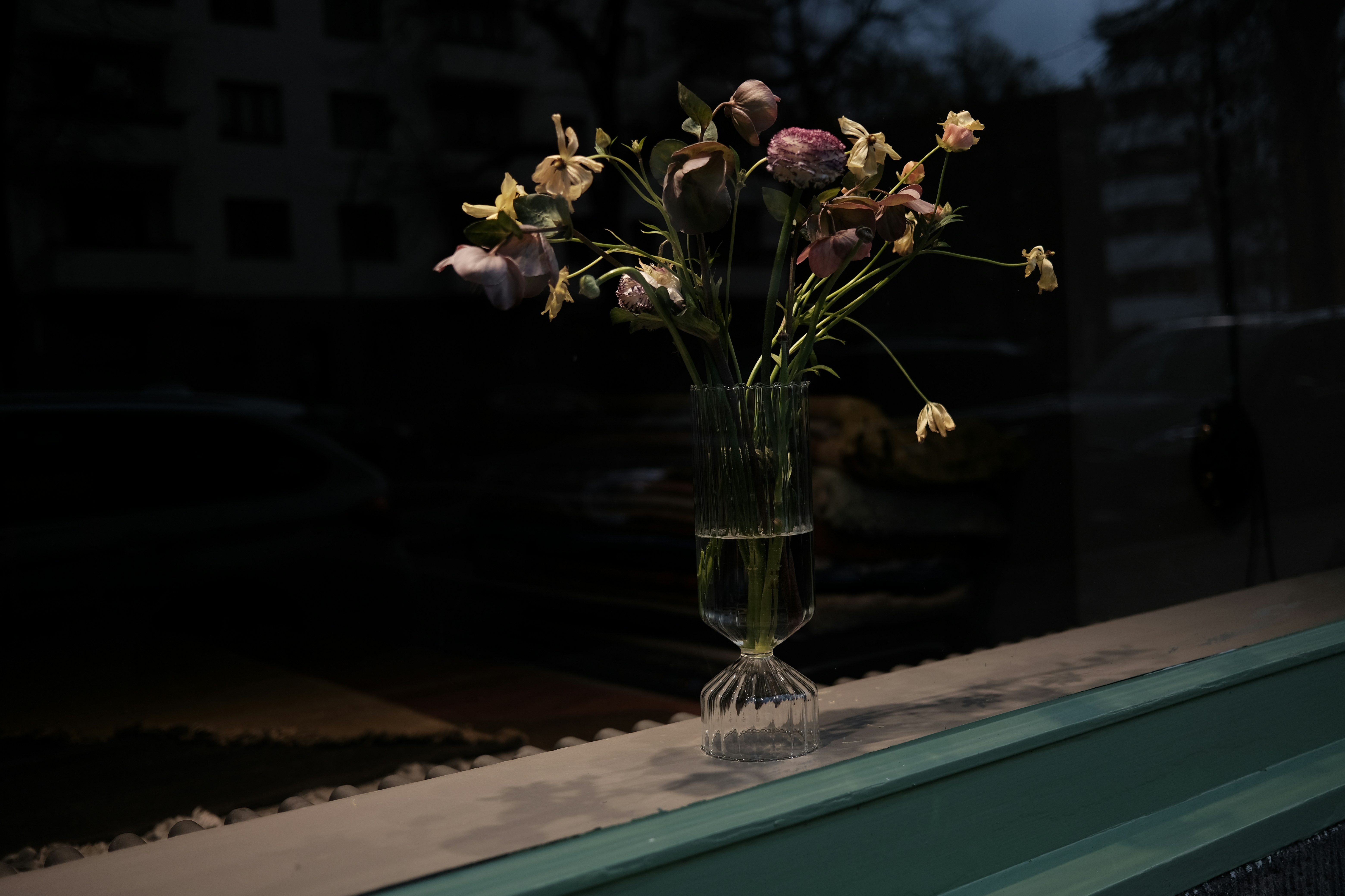 Withered Blooms in a Glass Vase: A Quiet Night Study