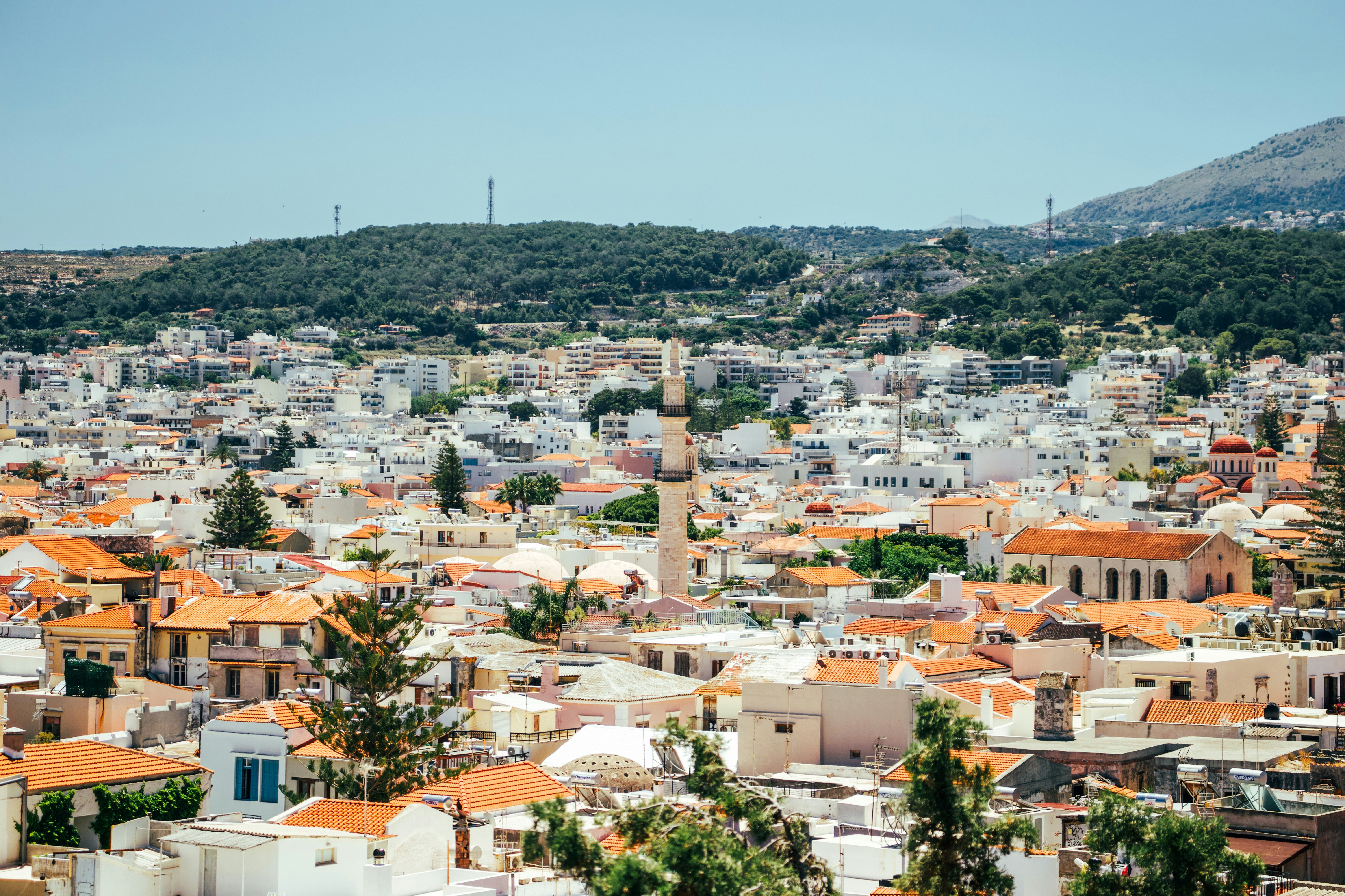 Terracotta Roofscape under a Bright Coastal Sky