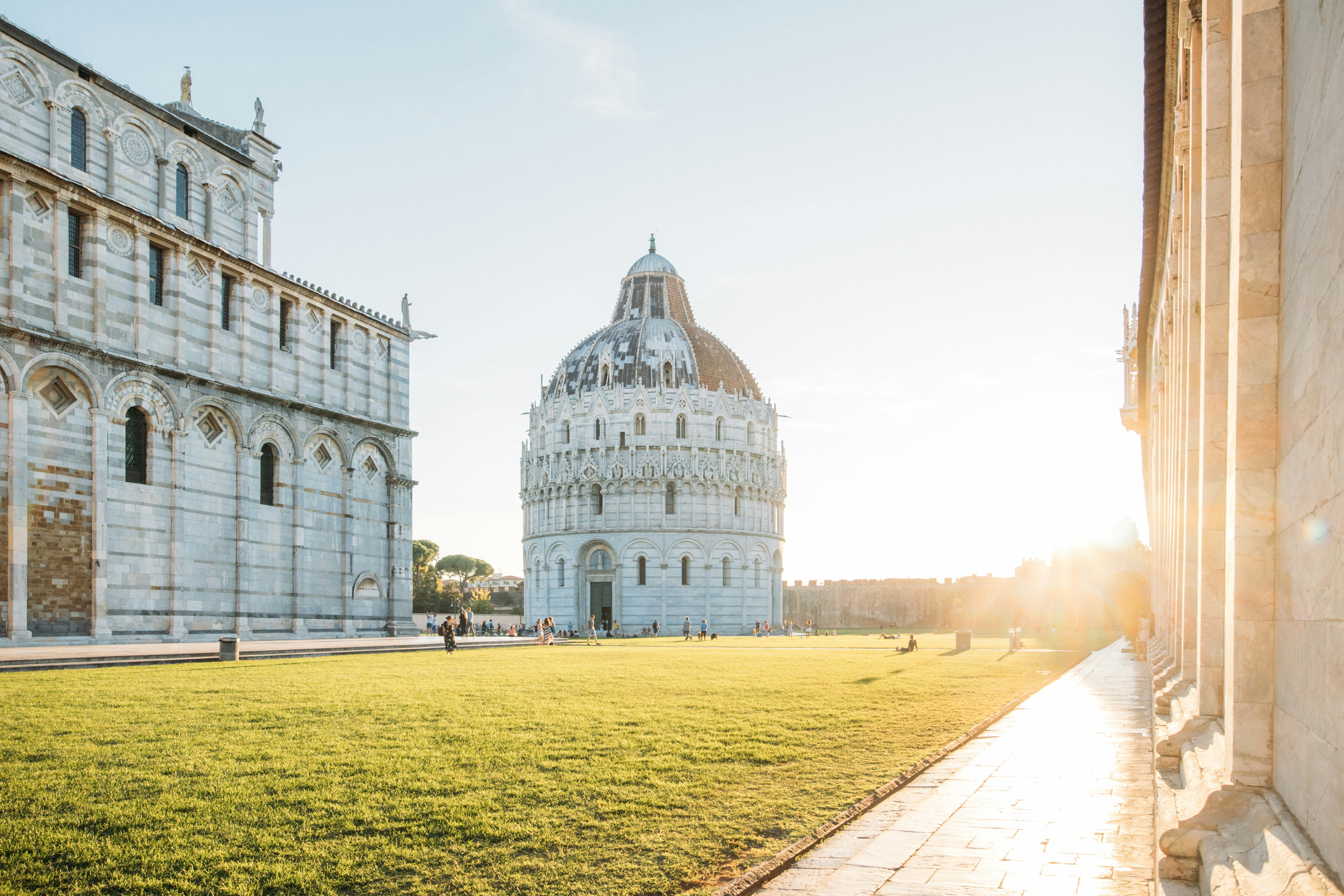 Sunlit Piazza: The Leaning Tower of Pisa Framed in Morning Light