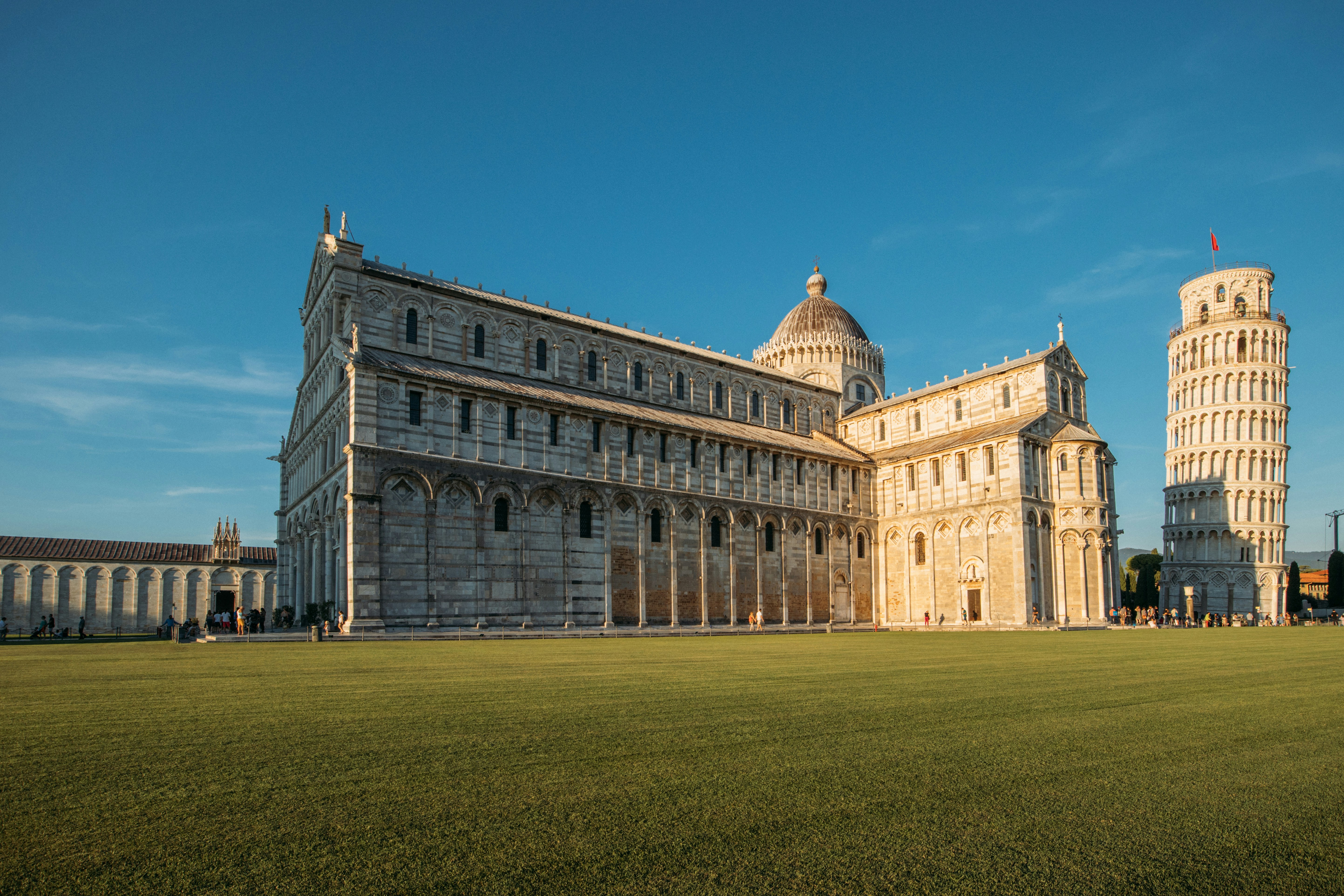 Towering Duomo and Leaning Bell Tower Over a Sunlit Piazza