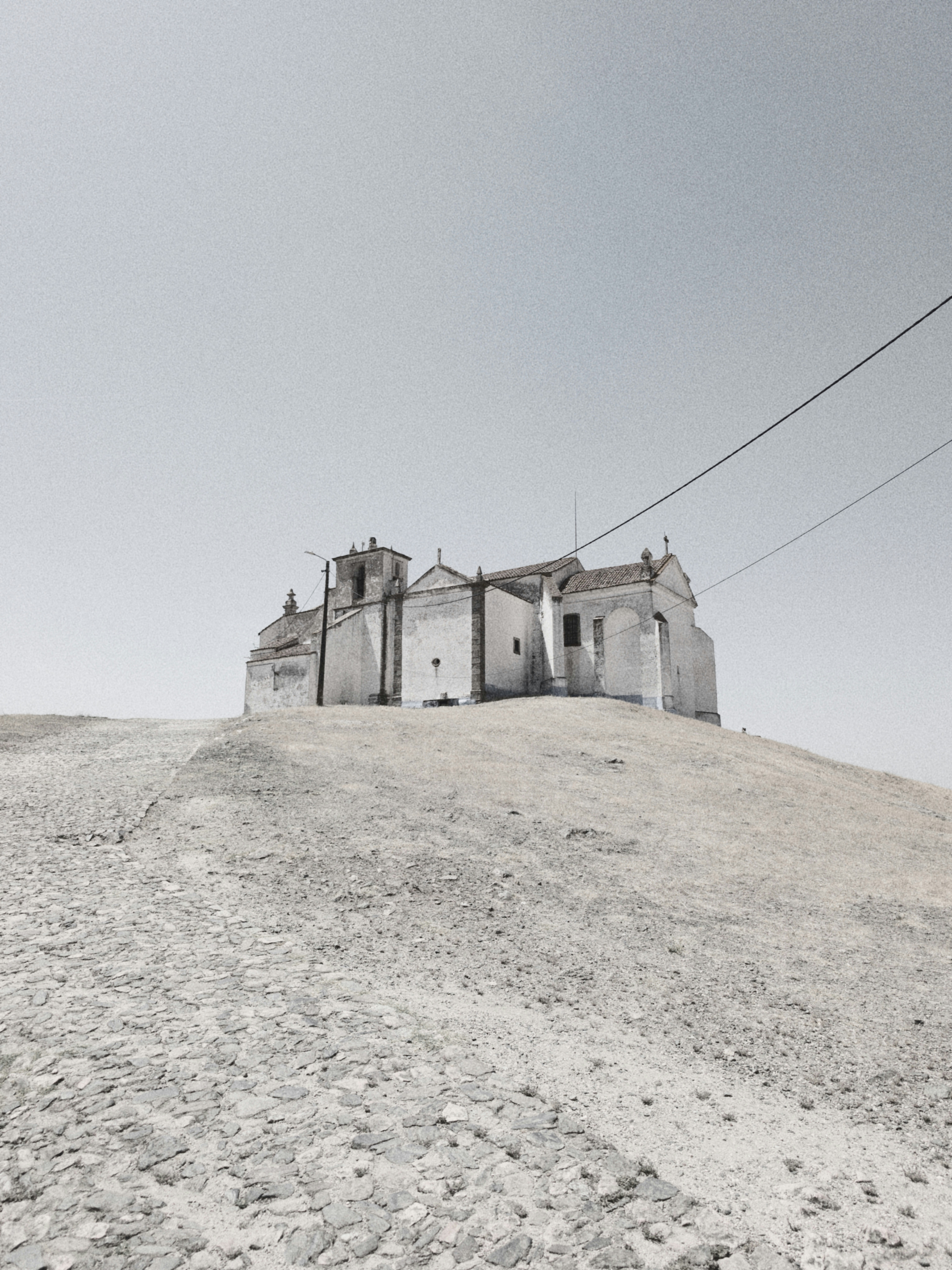 Isolated Chapel on a Sunbaked Rise