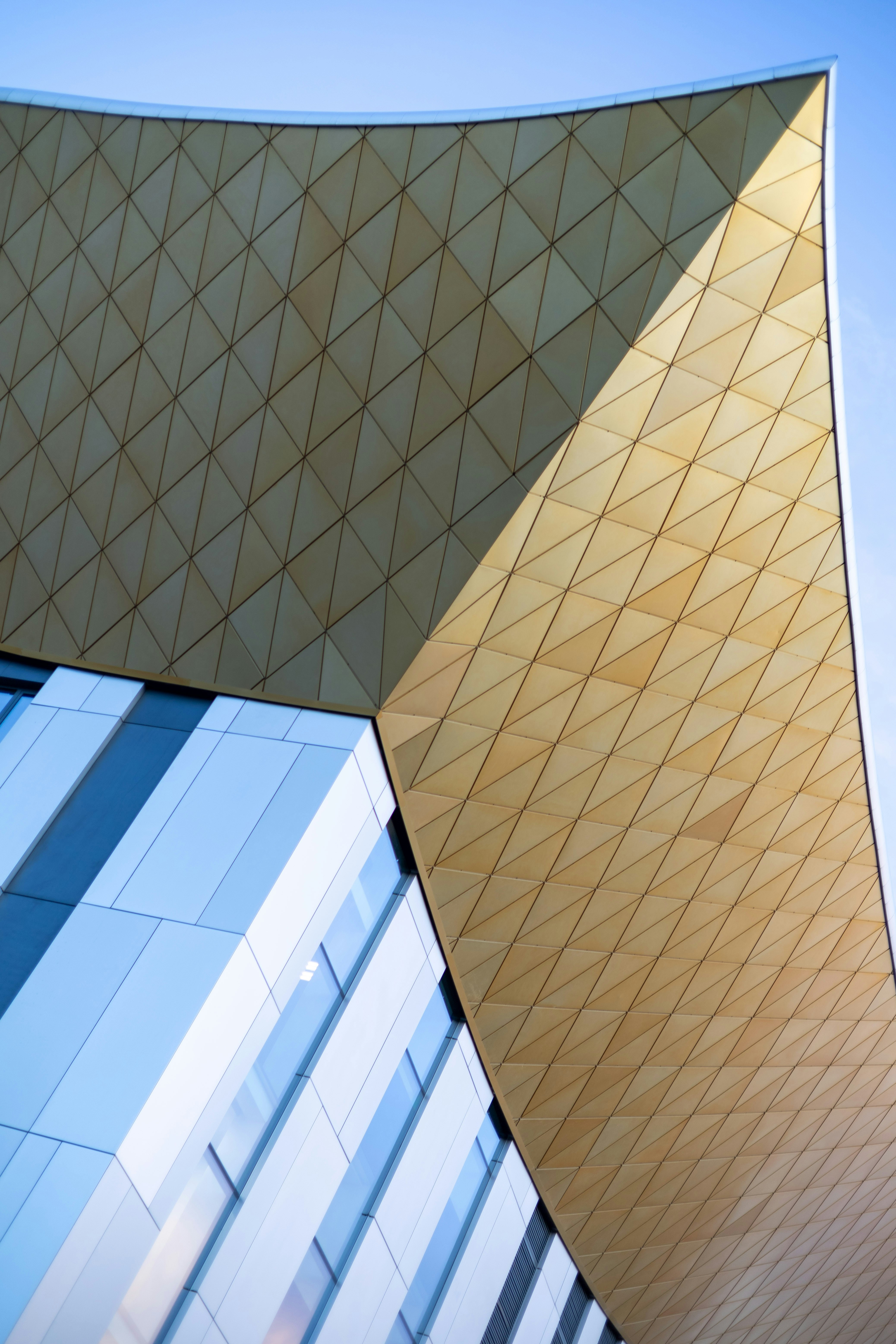 Golden Facade: A Sharp Corner Cutting Across the Sky
