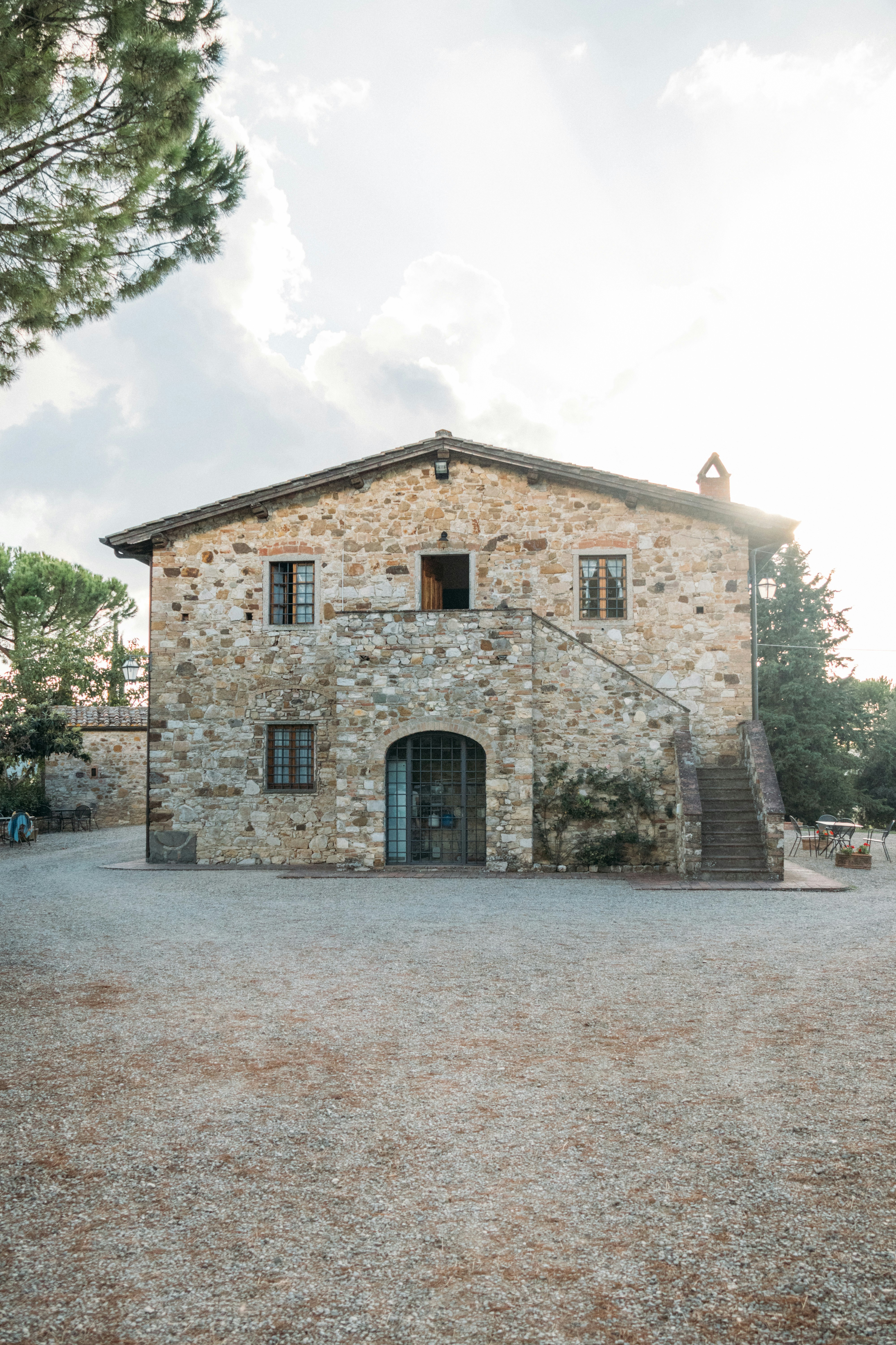 Stone Cottage Rising from a Quiet Courtyard
