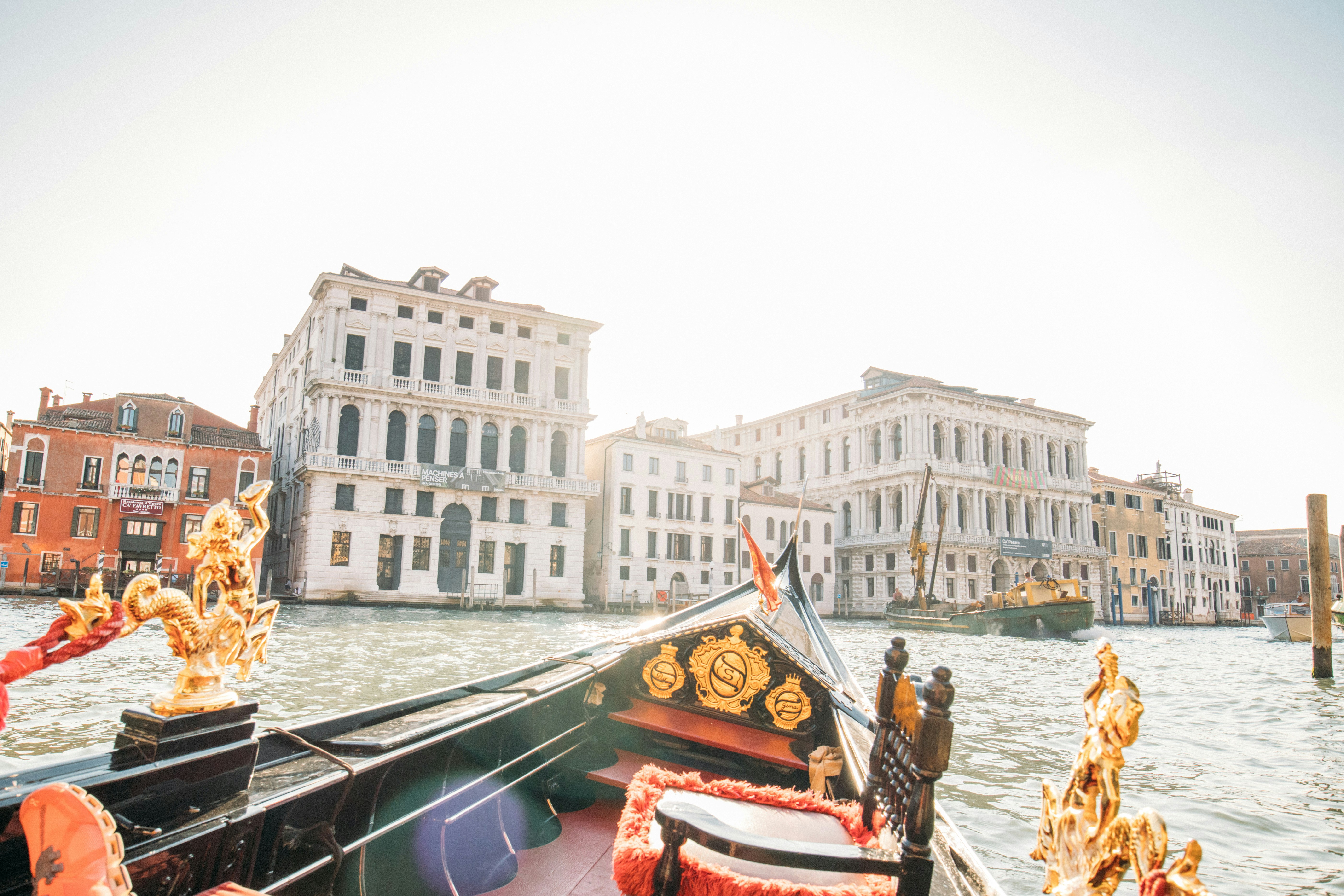 Gondola Glimpse: A Venetian Morning Along Sunlit Facades