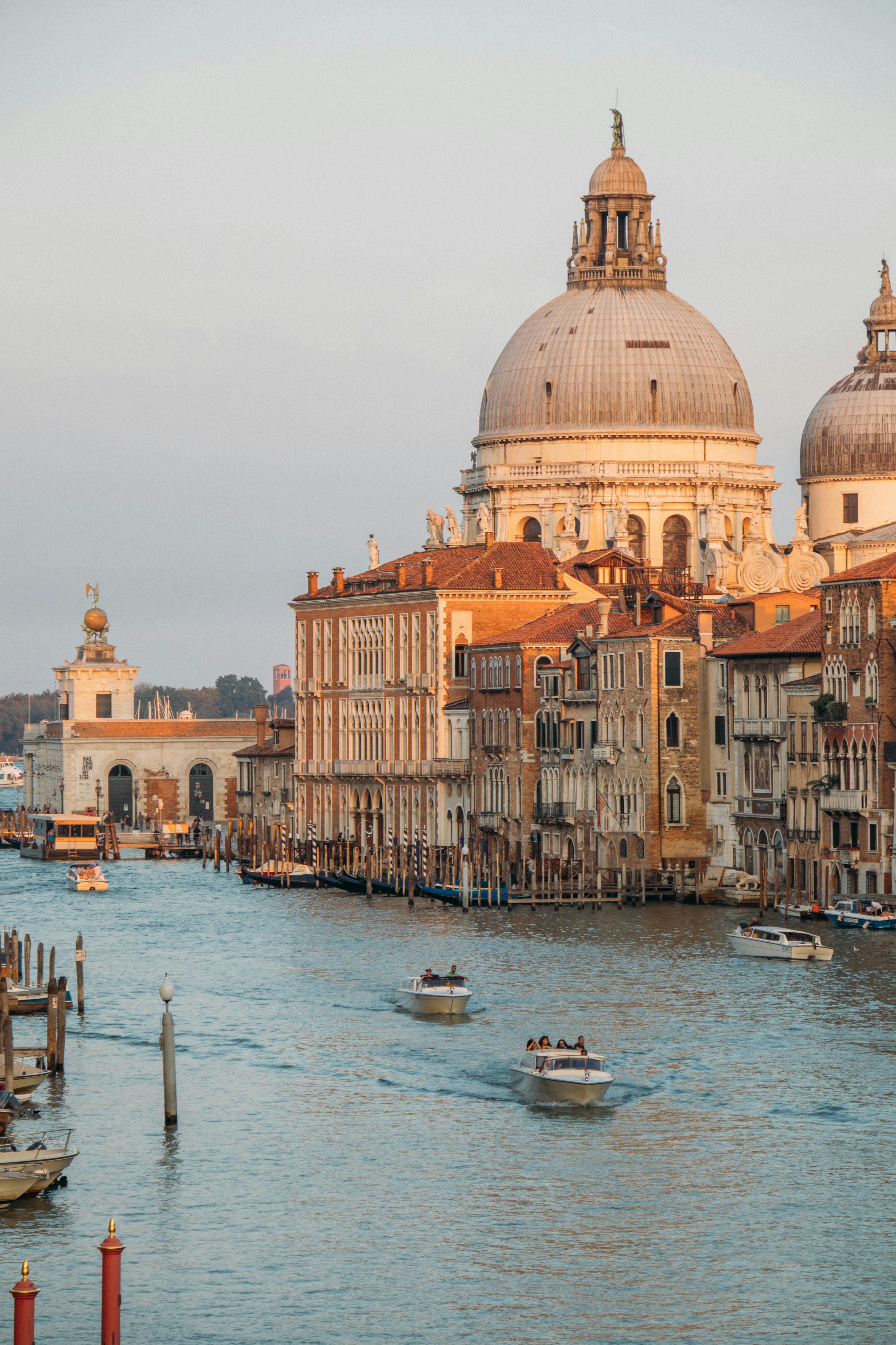 Promenade by the Grand Canal: The Basilica’s silhouette at sunset