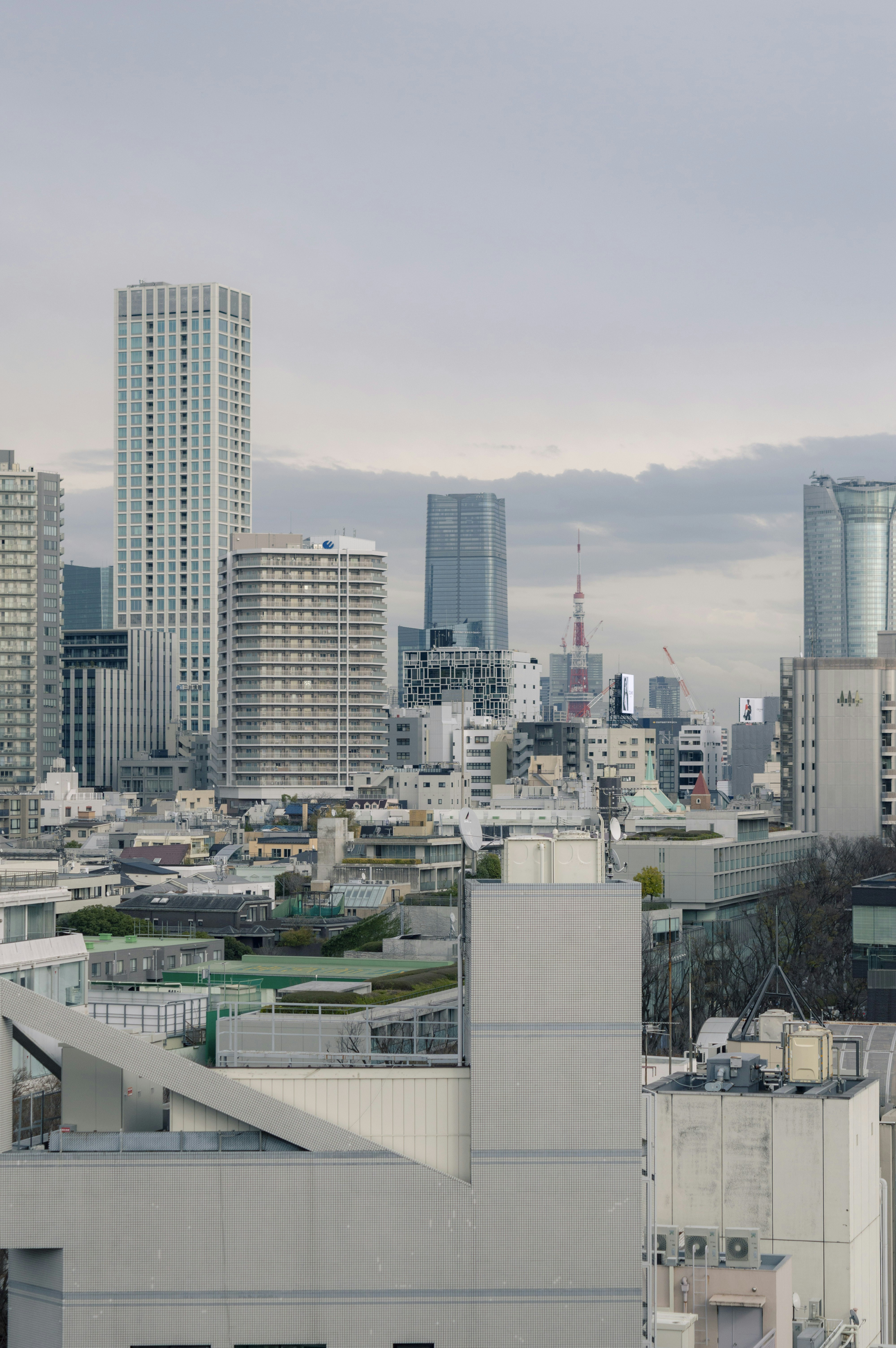 Concrete Skyline: A Quiet City Rise Over Gardens and Towers