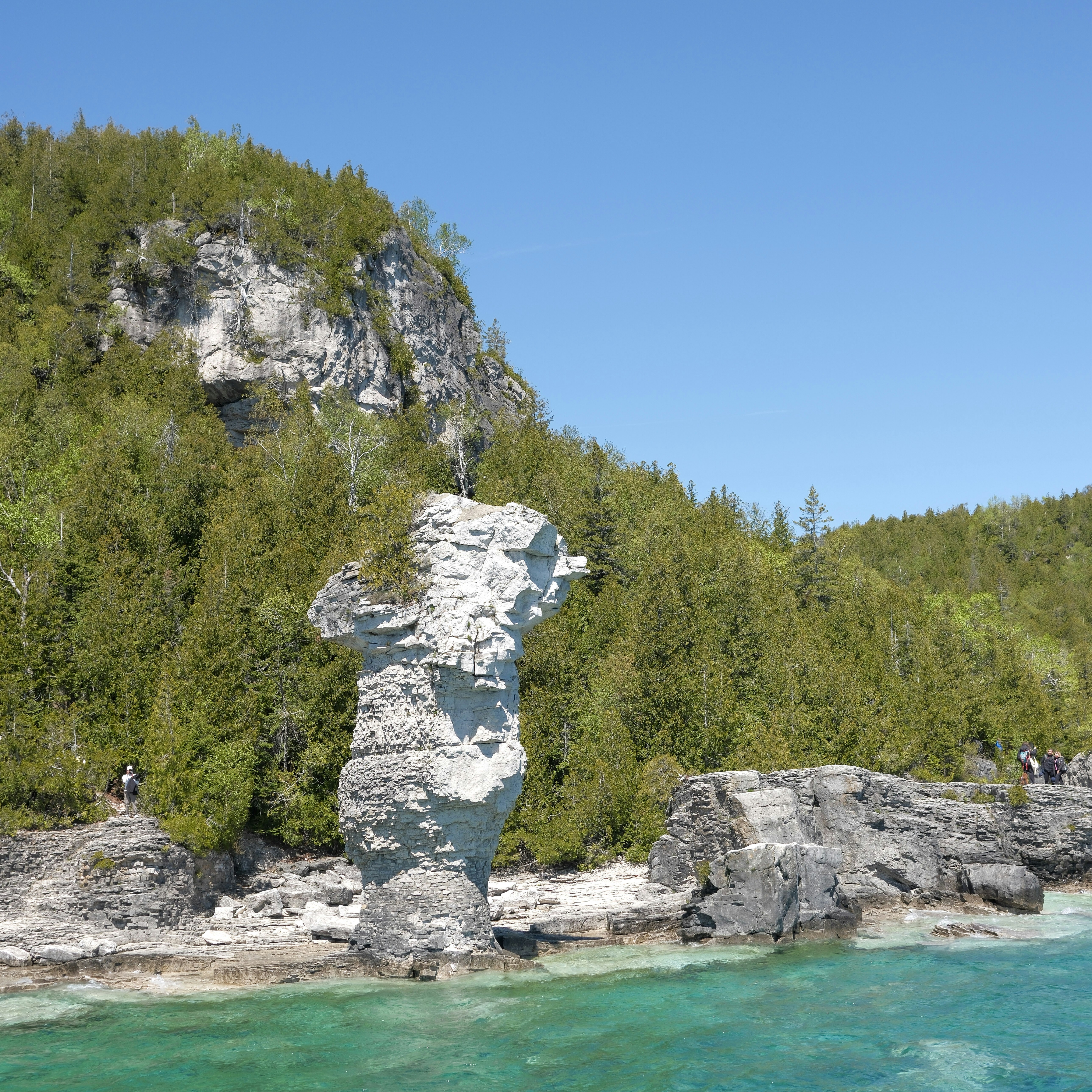 Stone Pillar Amid Turquoise Waters