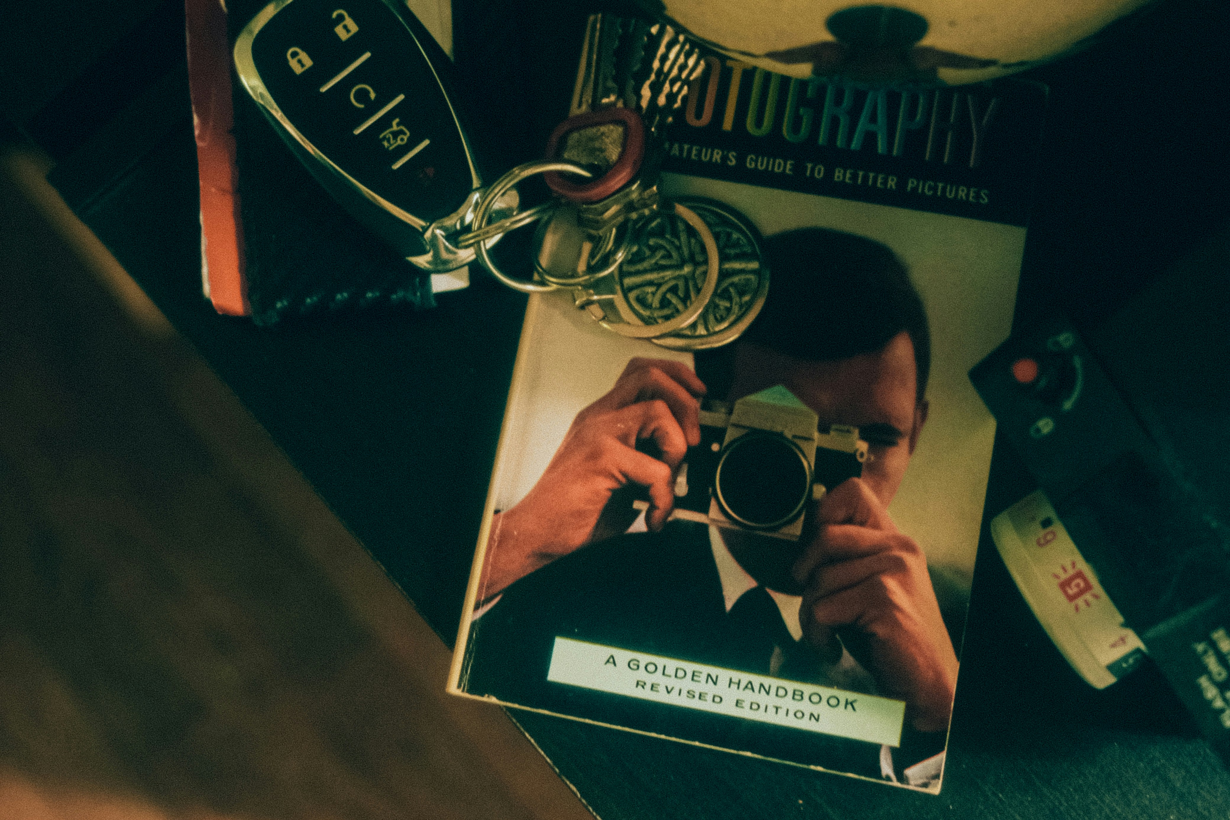 A Leica Moment Lands on a Desk Stack