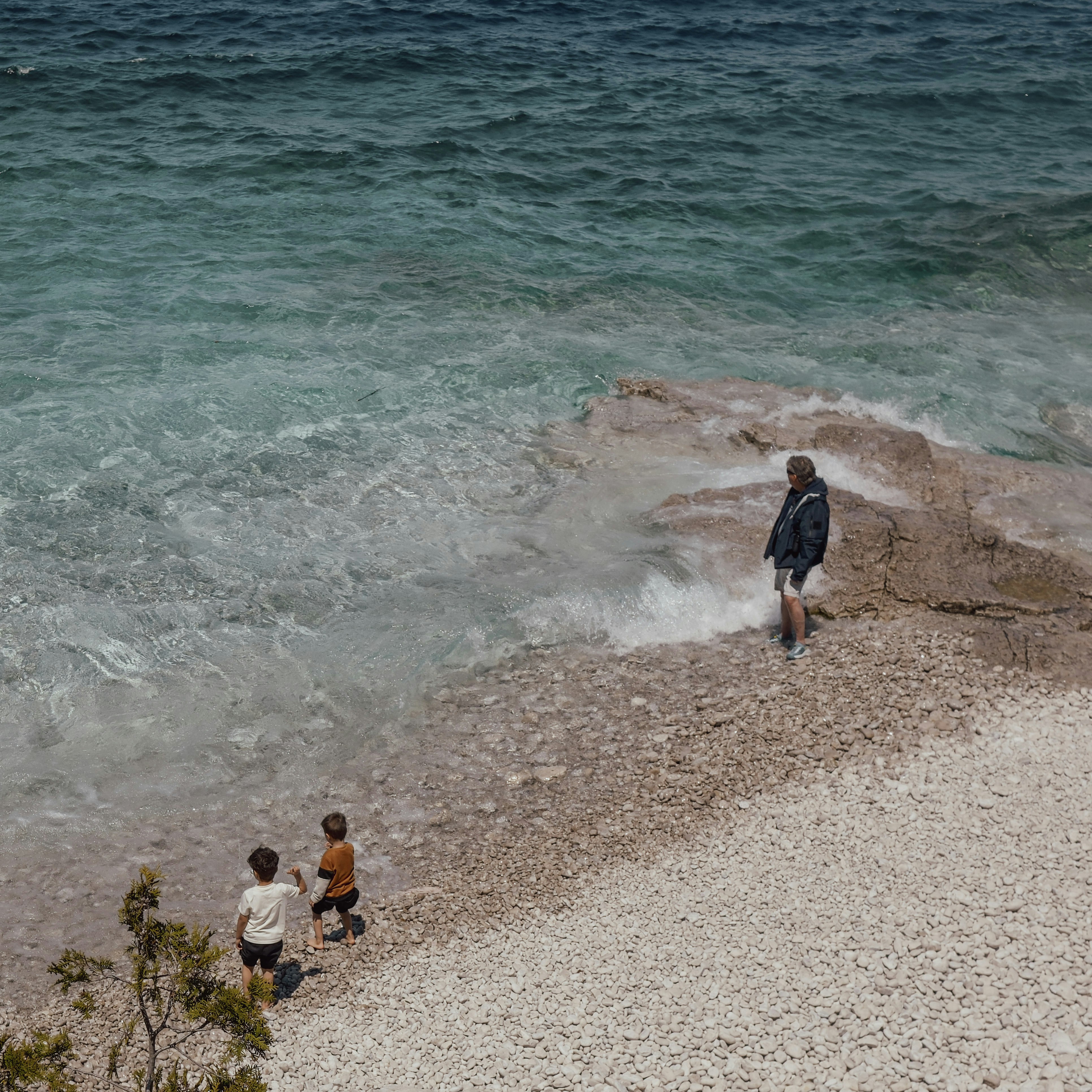 Three Explorers at the Edge: A Quiet Meeting with the Sea