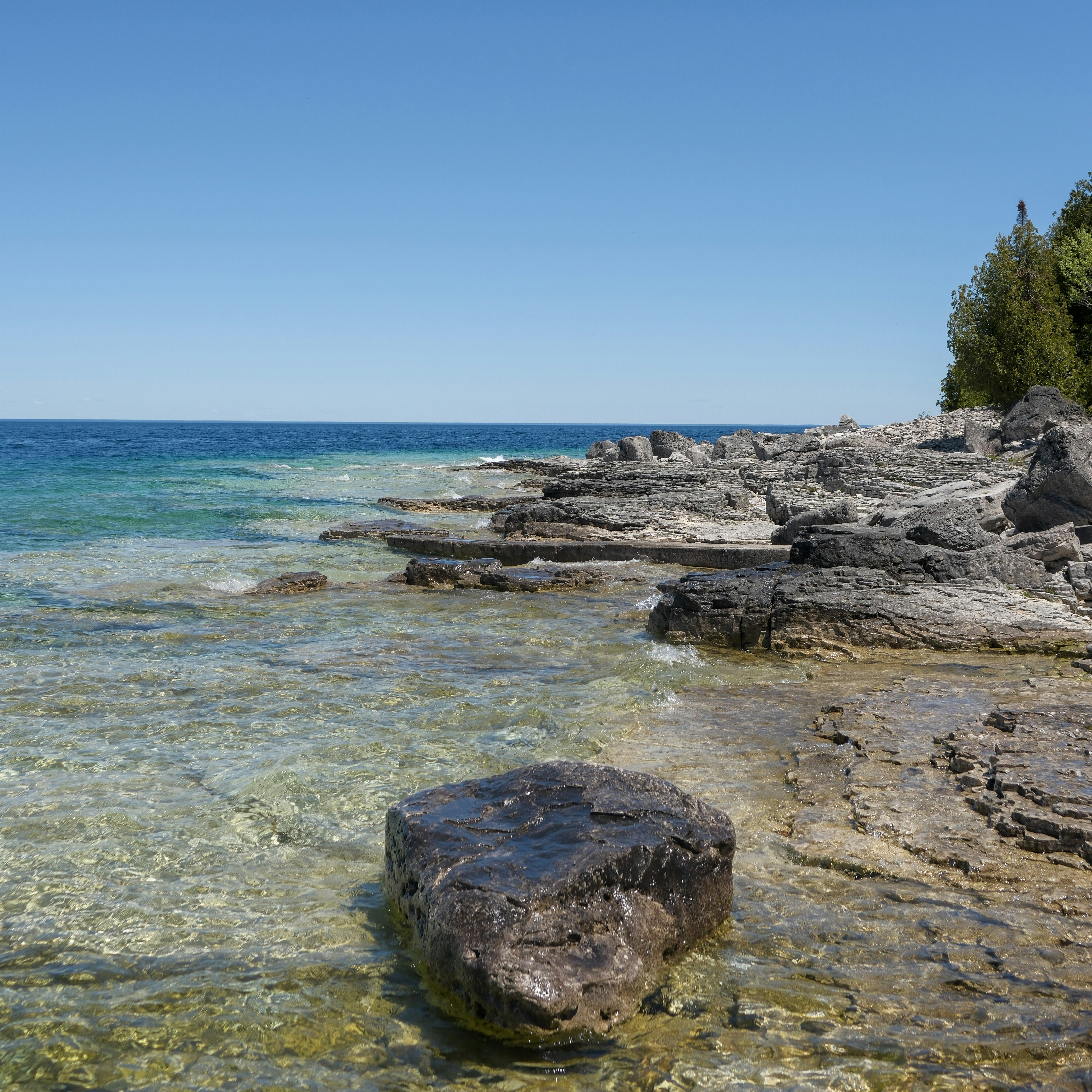 Sea-Born Rocks: A Quiet Stretch of Coastal Stone and Clear Water