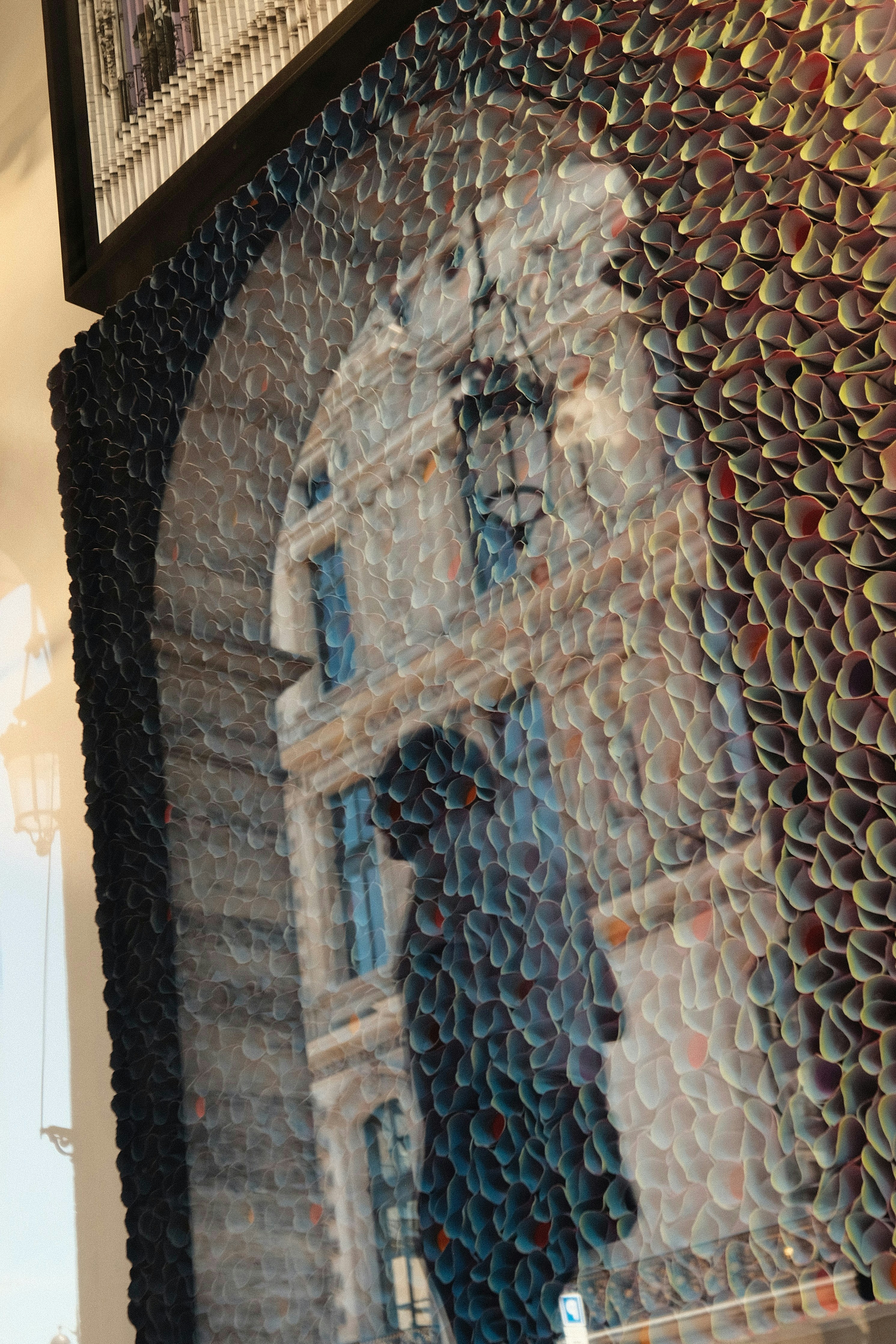 Facade Through a Mosaic of Curved Glass Scales