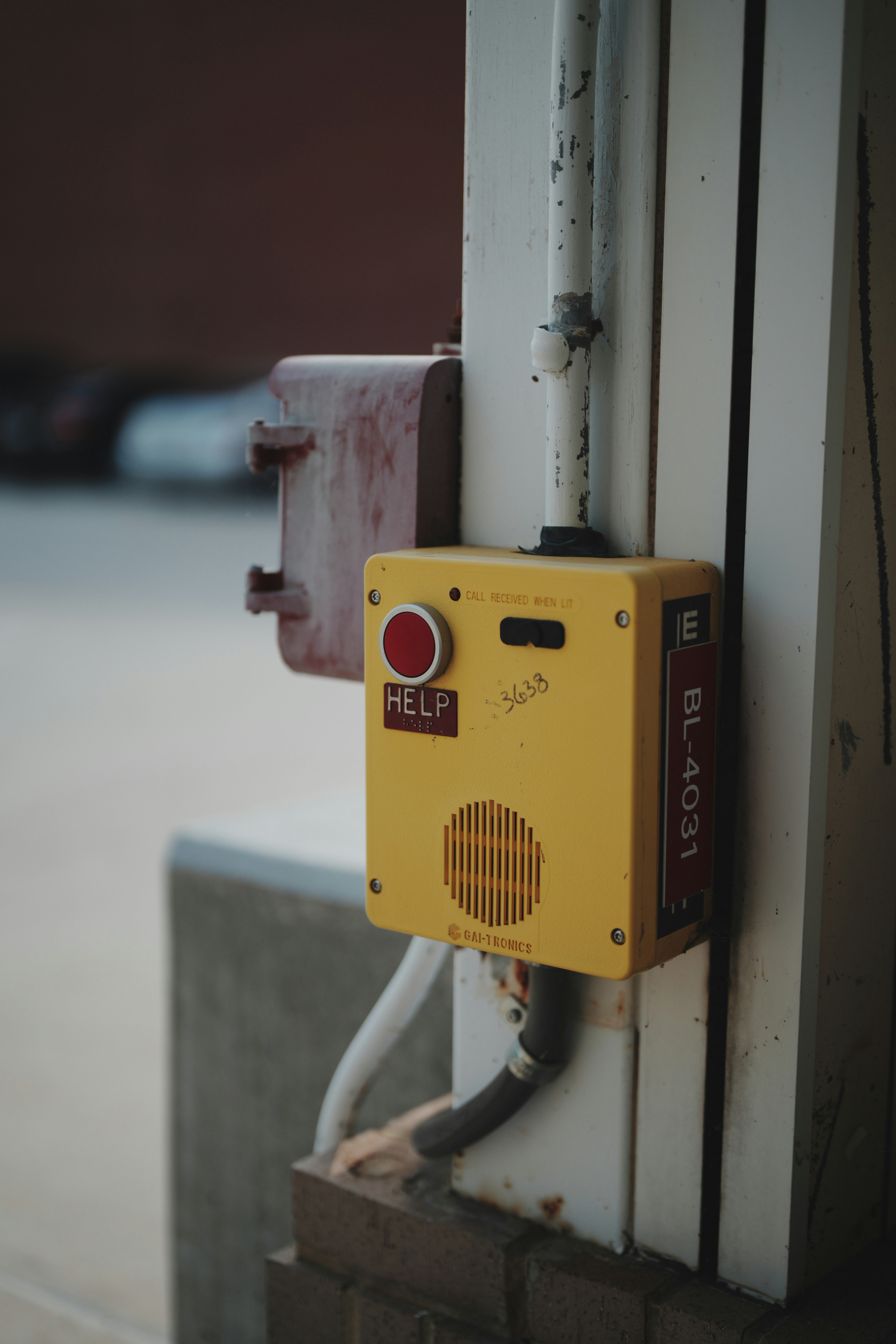 Yellow Safety Signal on Industrial Column
