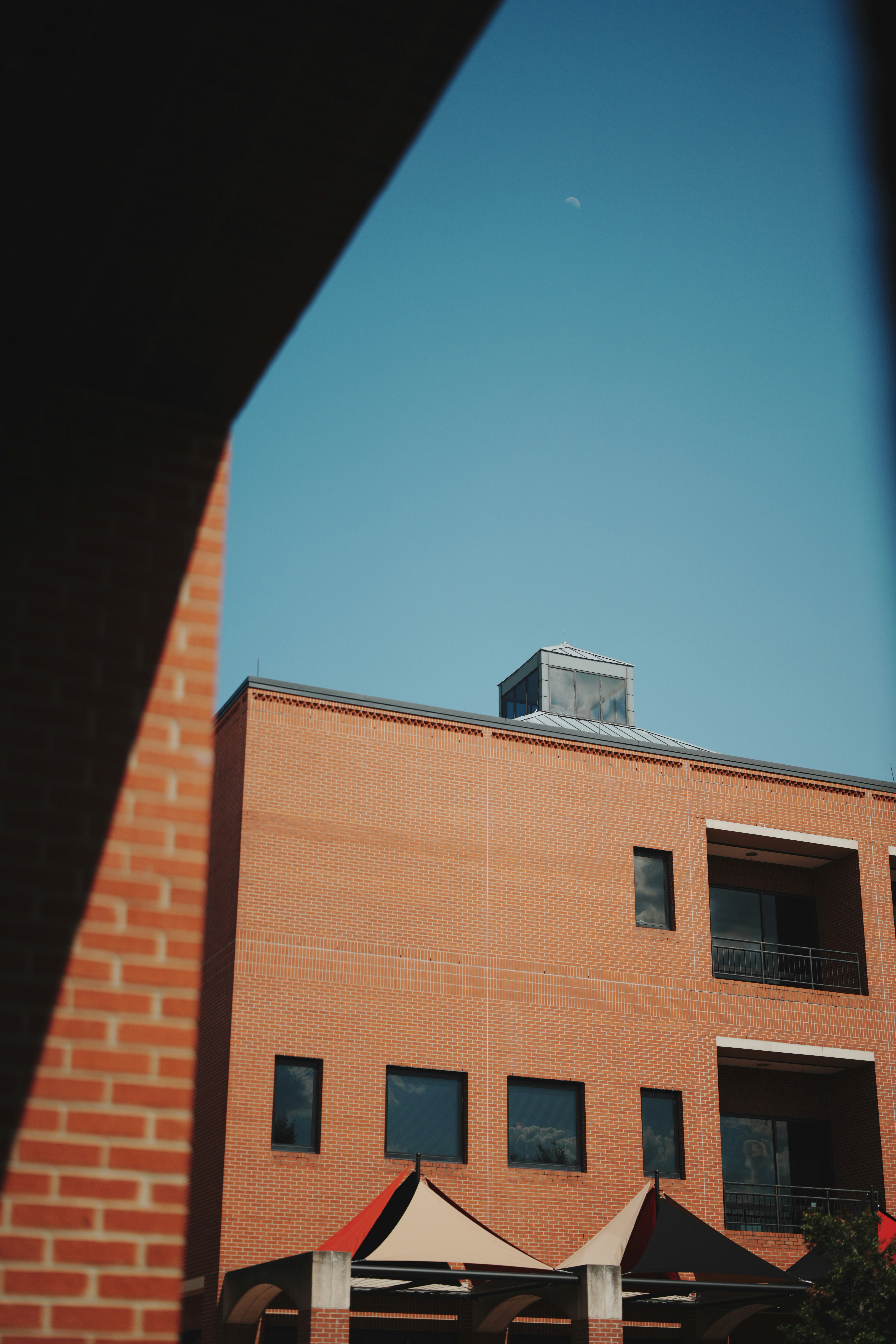 Brick Architecture Under Clear Afternoon Sky