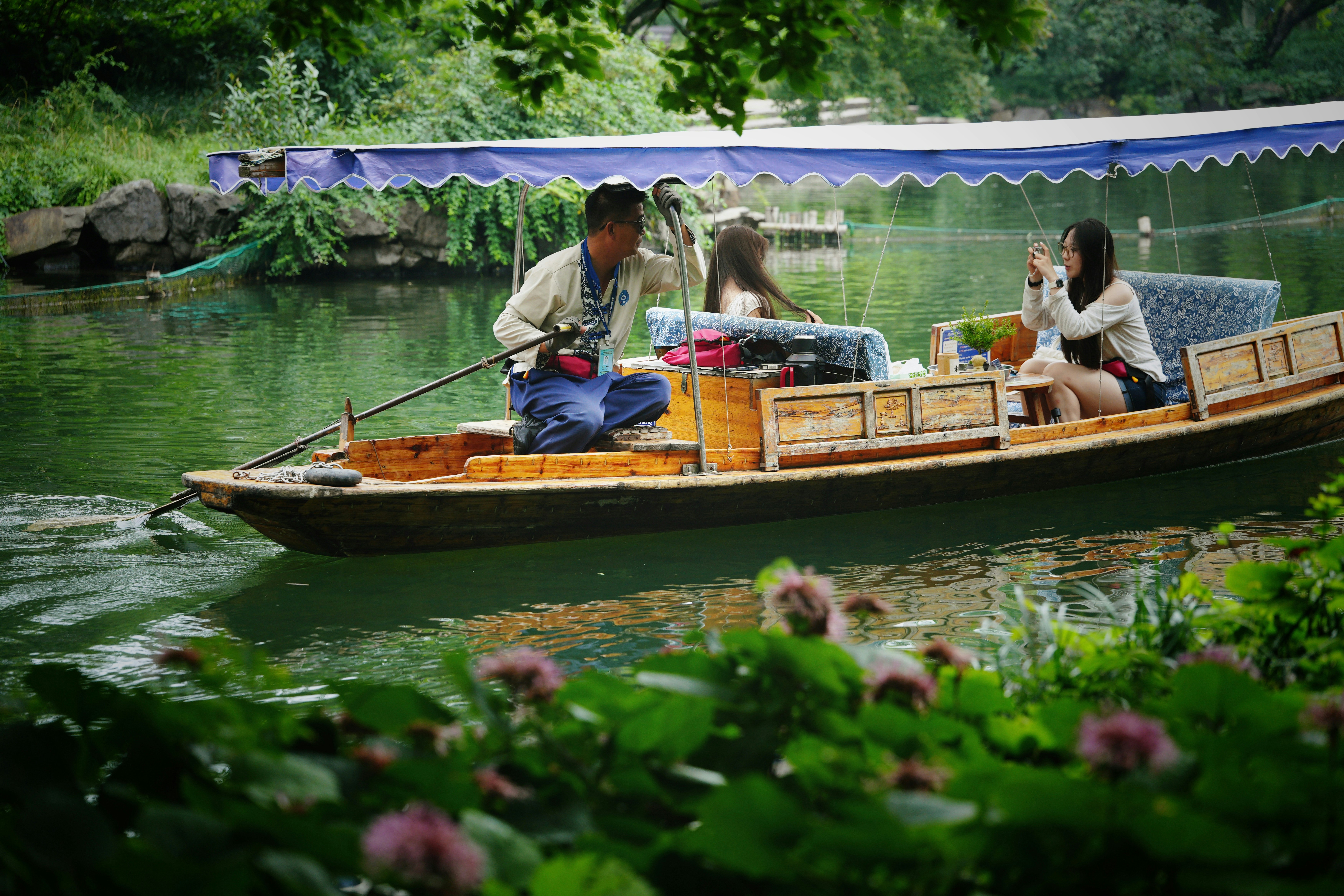 Boatside Portrait: A Quiet Moment on the Lantern-Leaf Canal