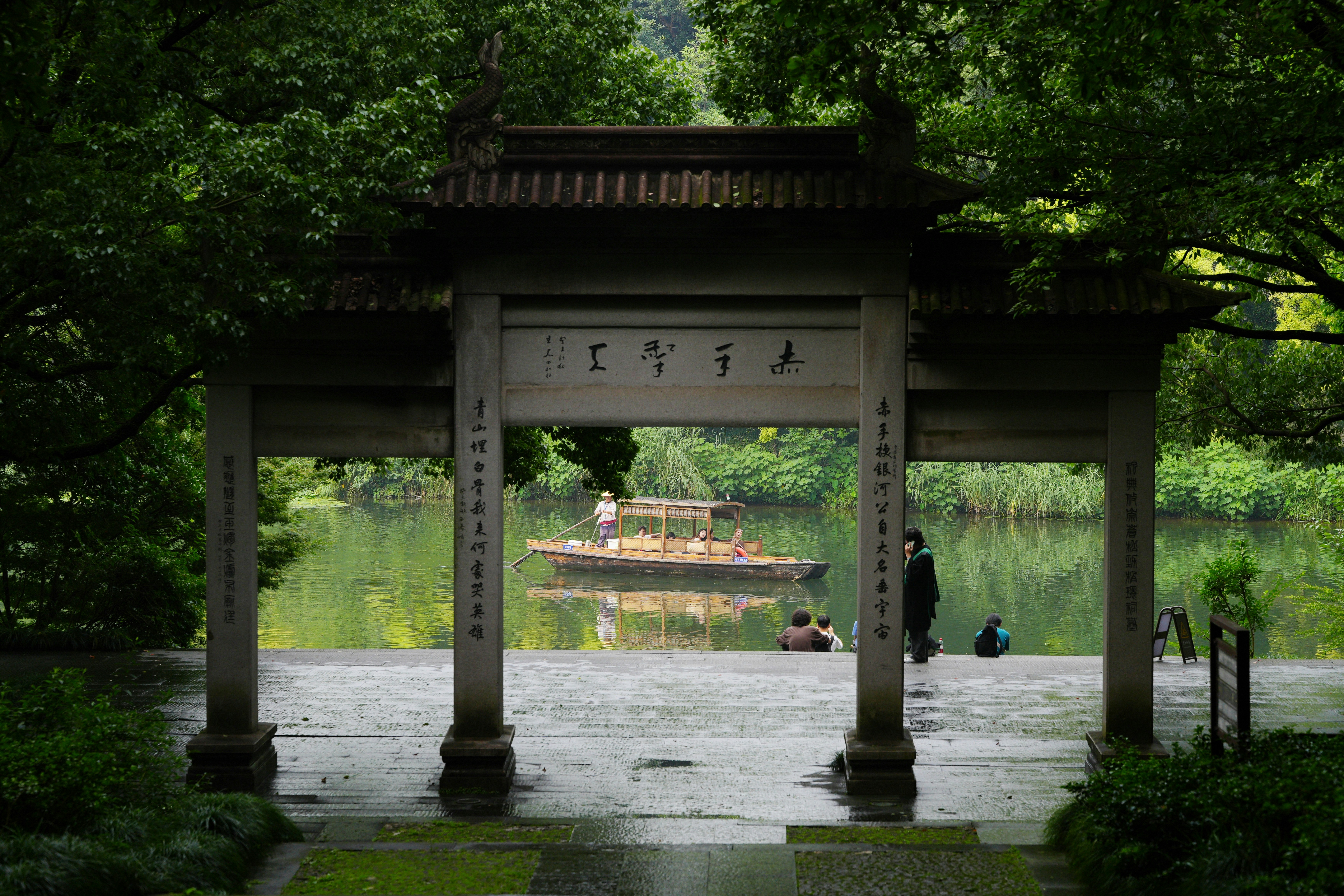 Bridge Frame and Boat on a Tranquil Lake